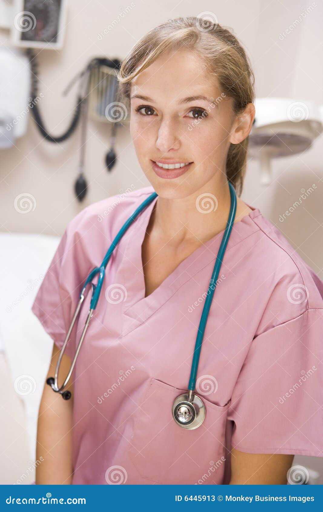 Young Female Doctor in Pink Scrubs Stock Image - Image of staff, happy ...