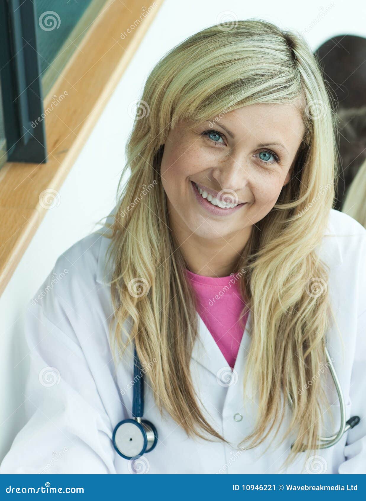 Young Female Doctor Smiling Stock Image - Image of happy, friendly ...