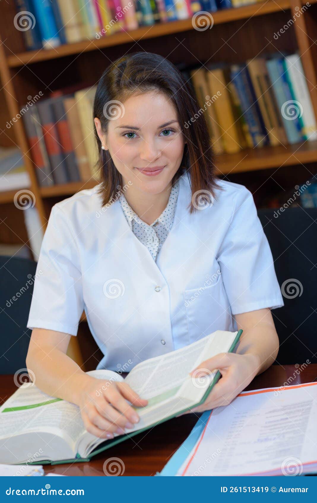Young Female Doctor Studying in Library Stock Image - Image of career ...