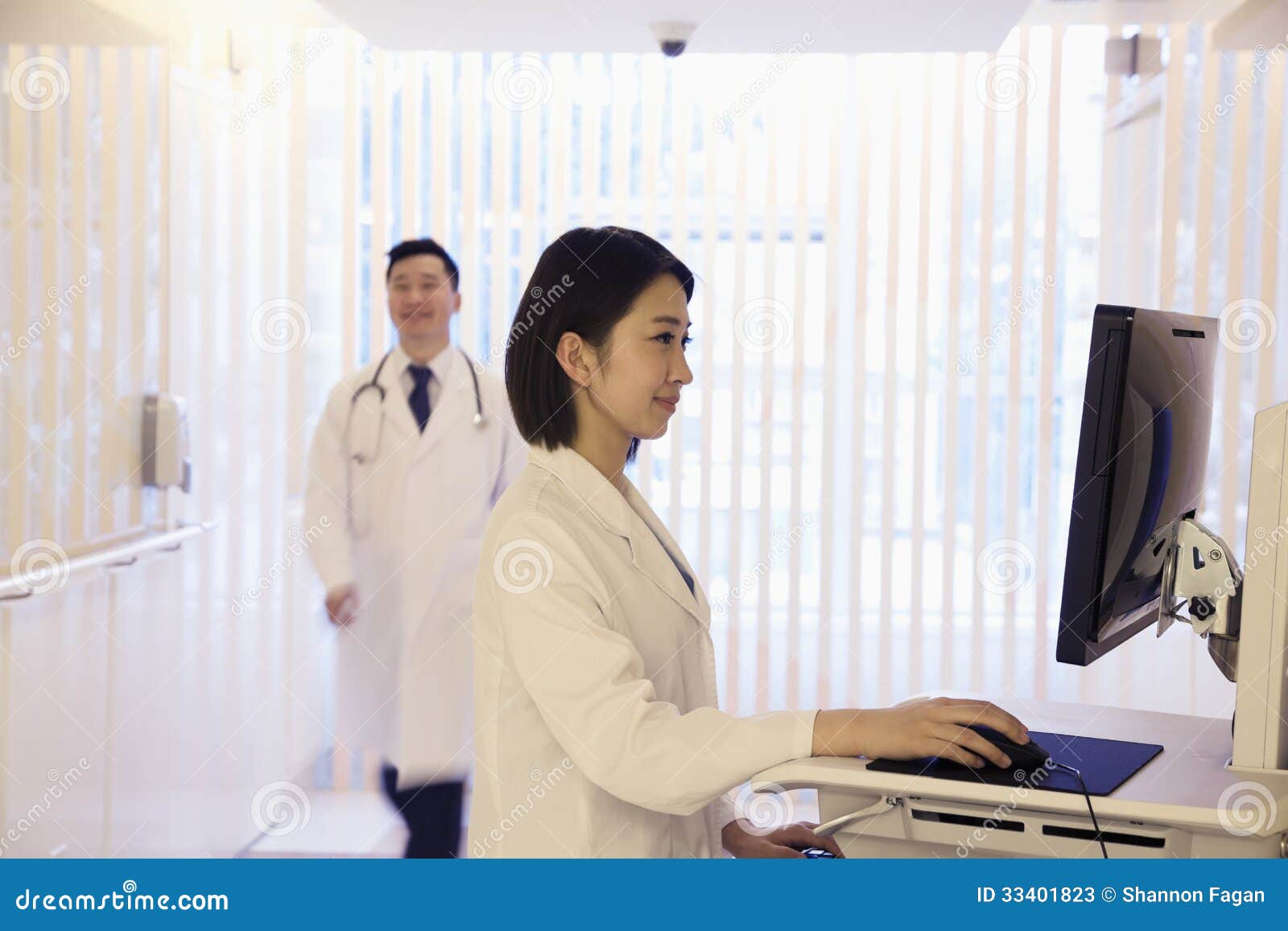 Young Female Doctor Using the Computer in the Hospital, Beijing, China ...