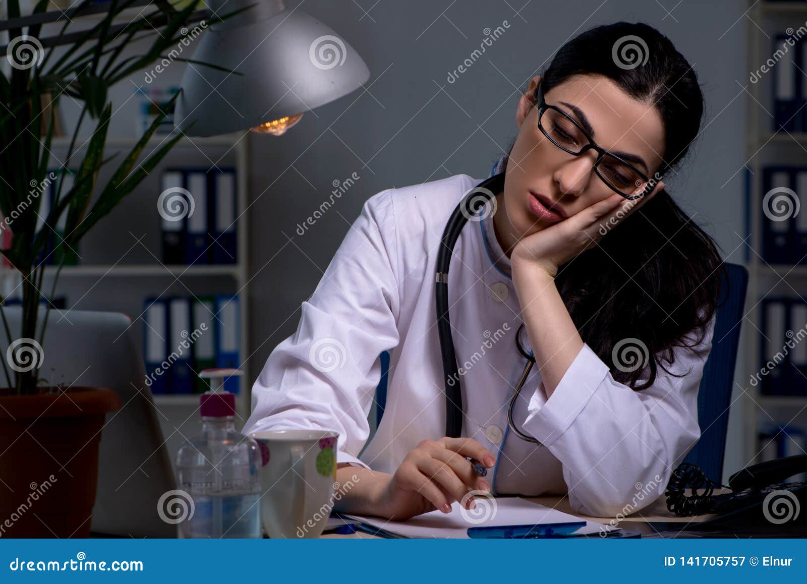 The Young Female Doctor Working at Night Shift Stock Image - Image of ...
