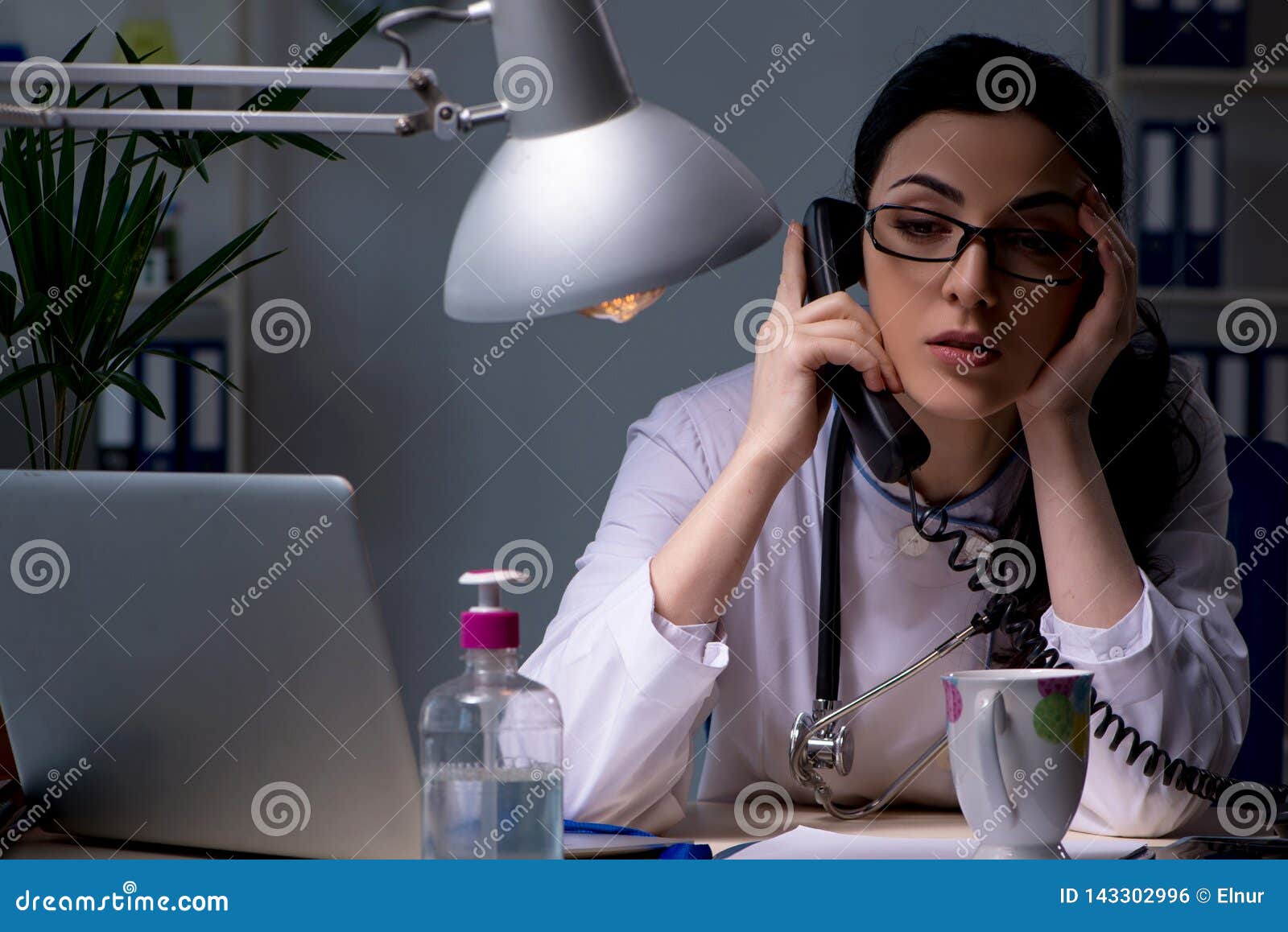 The Young Female Doctor Working at Night Shift Stock Photo - Image of ...
