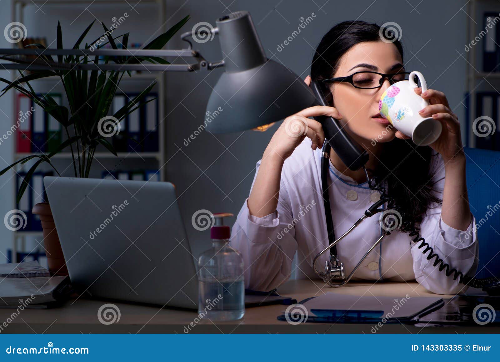 The Young Female Doctor Working at Night Shift Stock Image - Image of ...