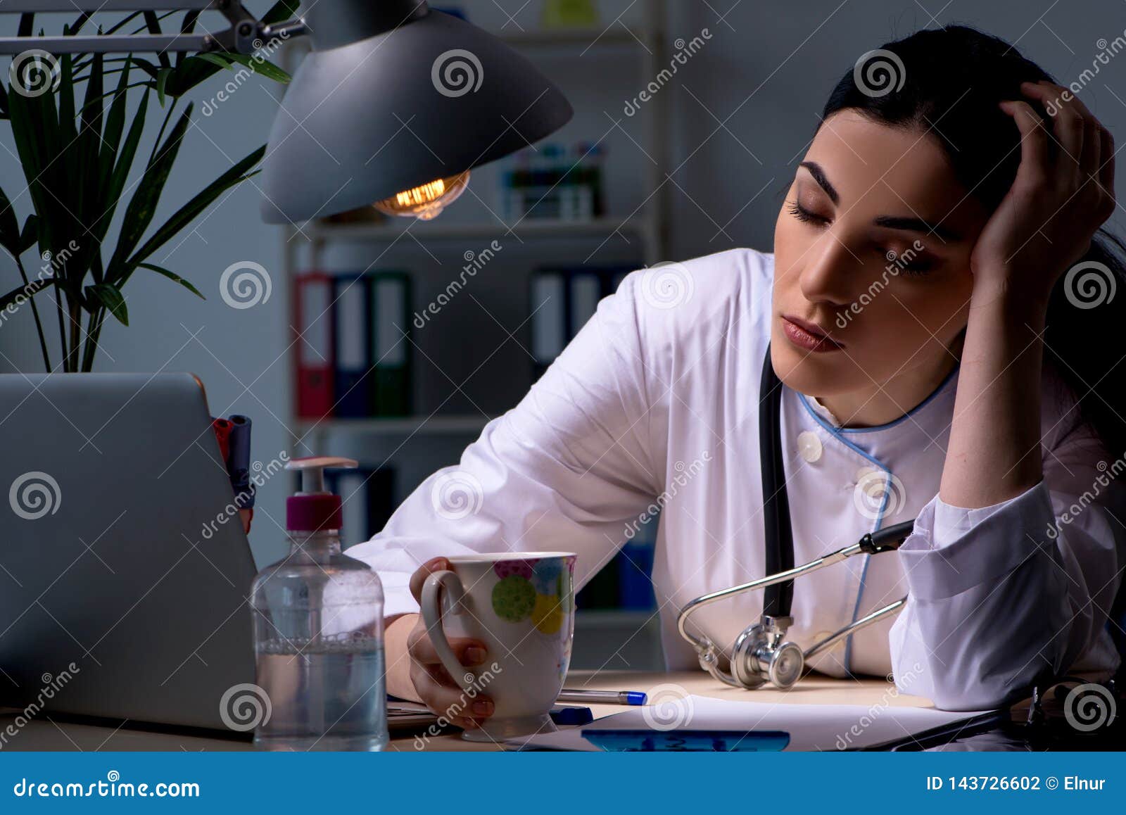 The Young Female Doctor Working at Night Shift Stock Photo - Image of ...