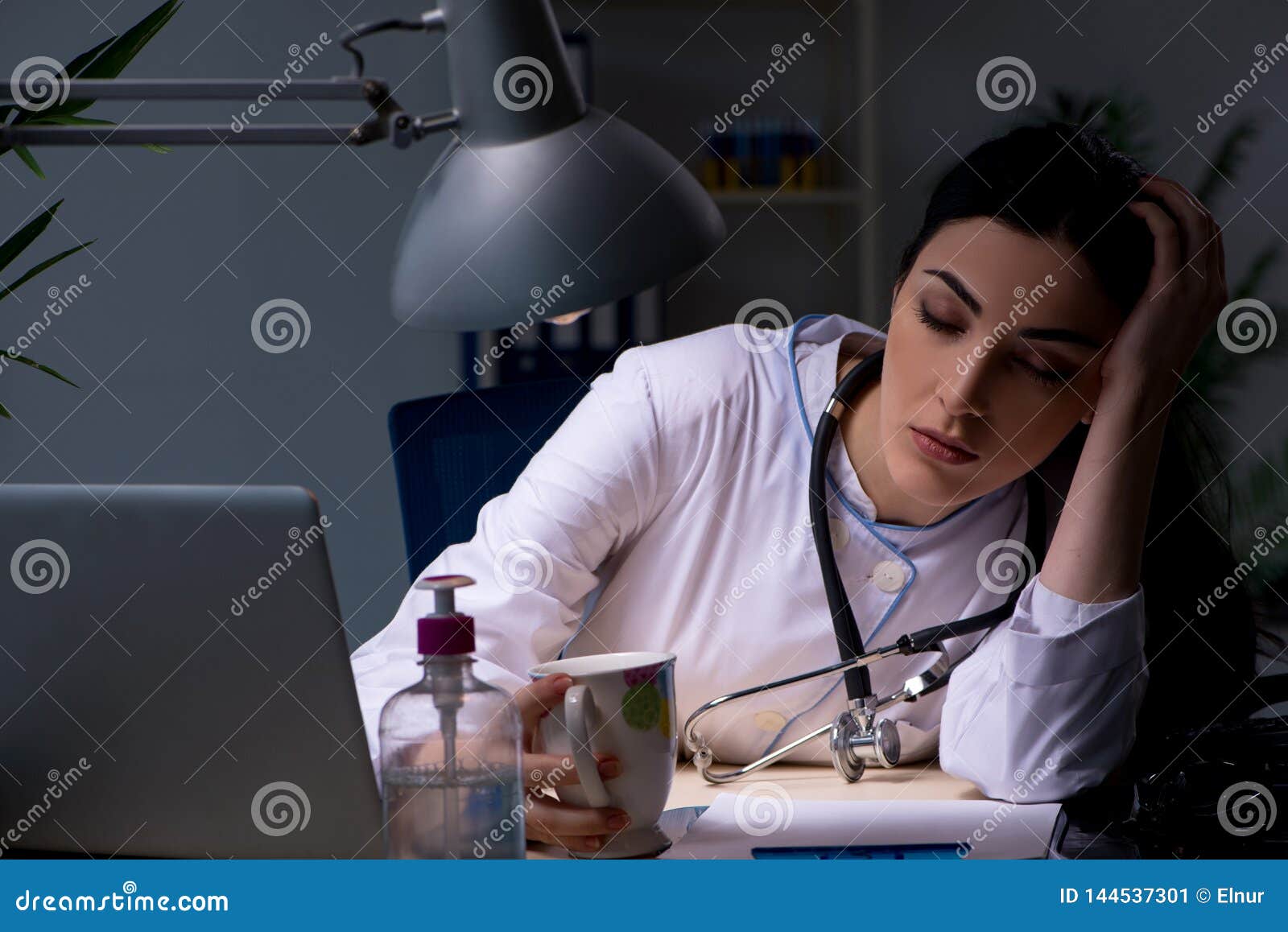 The Young Female Doctor Working at Night Shift Stock Image - Image of ...