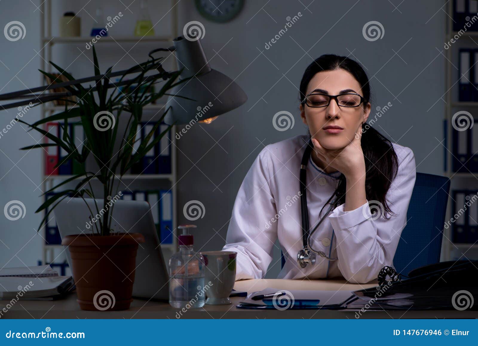 The Young Female Doctor Working at Night Shift Stock Photo - Image of ...