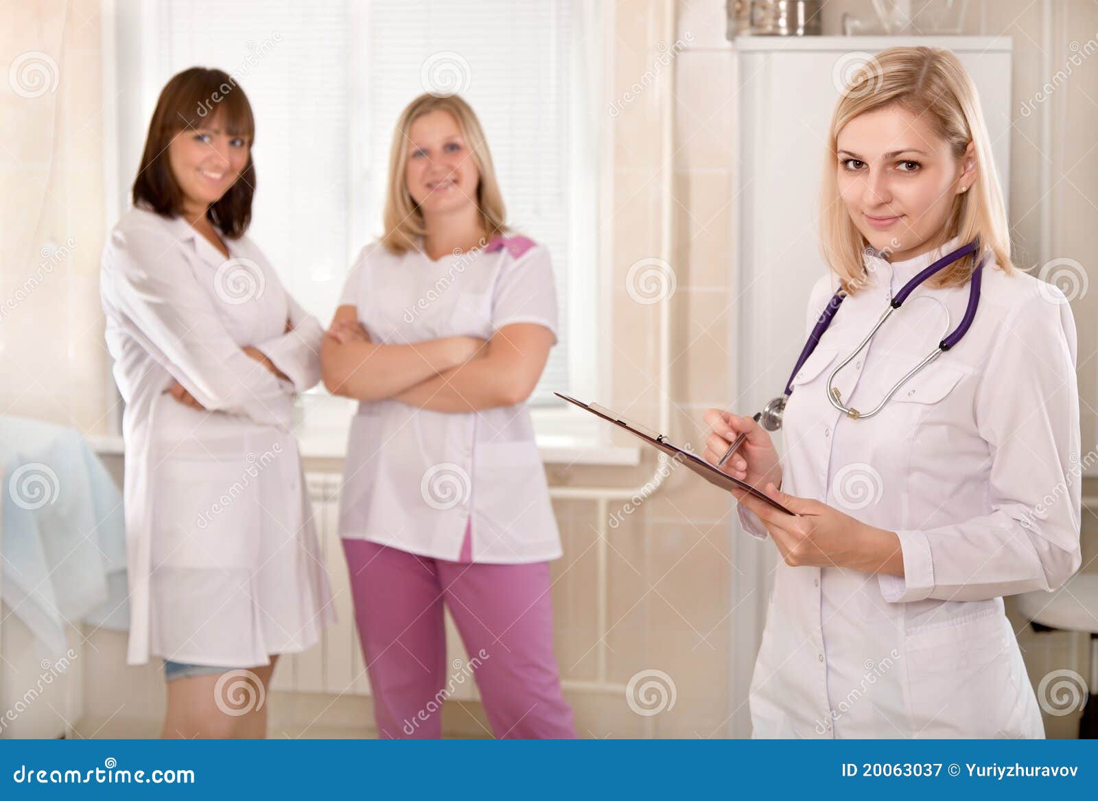 Young Female Doctors Team in Hospital Stock Image - Image of positive ...