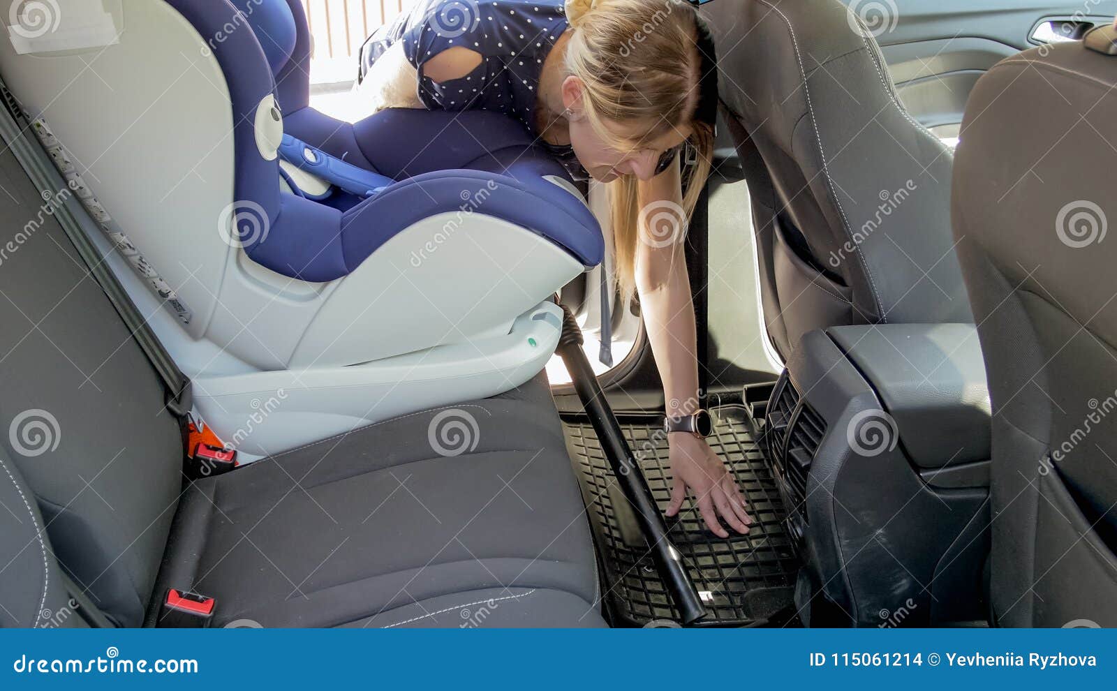 Young Female Driver with Vacuum Cleaner in Car Stock Photo - Image of ...