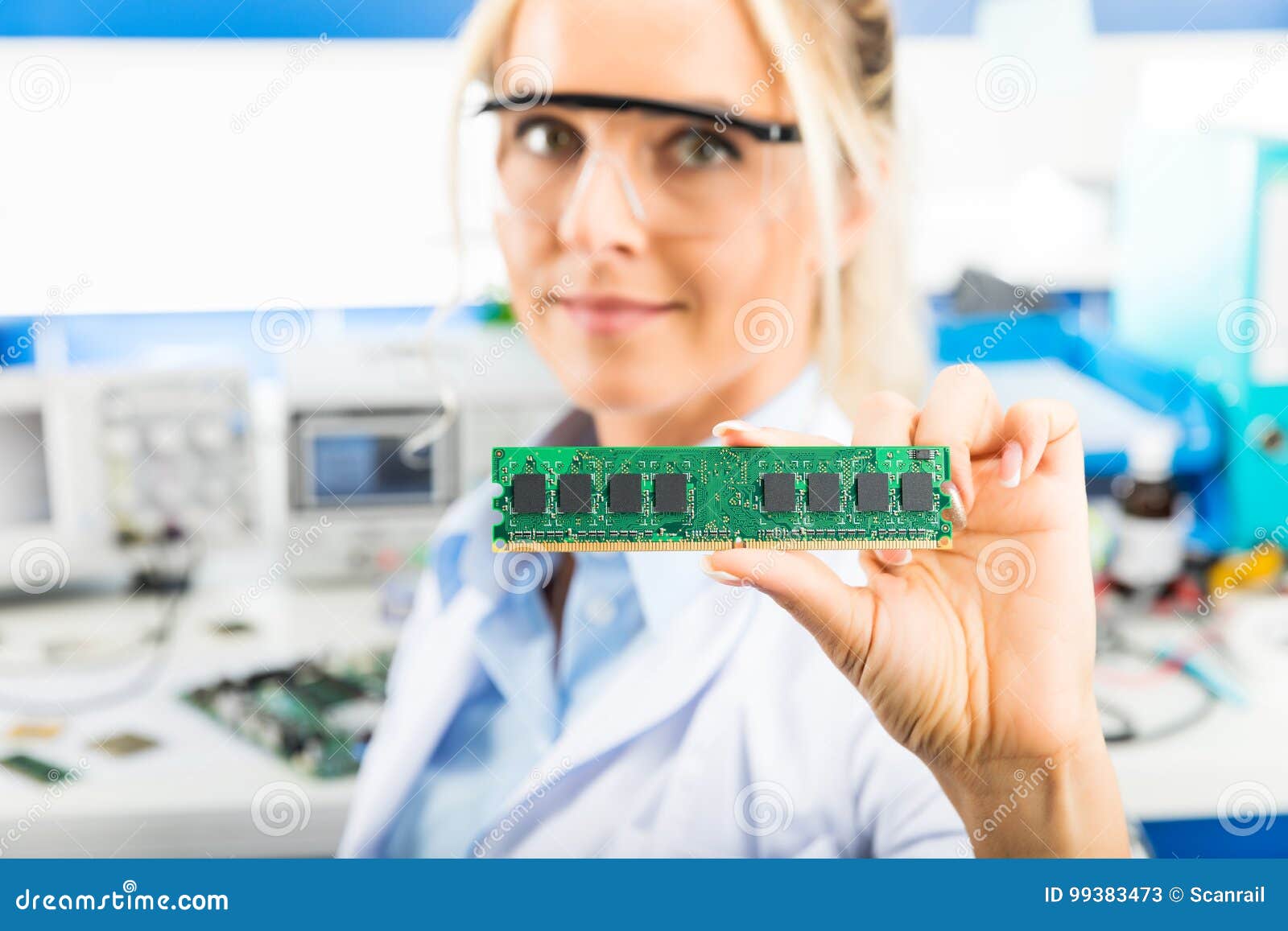 Young Female Electronic Engineer Holding Memory Module in Hand Stock ...