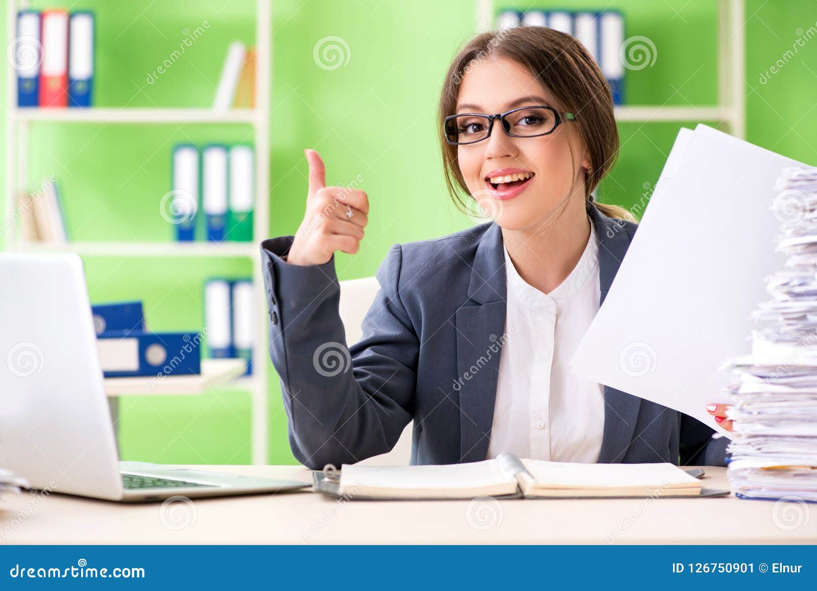 The Young Female Employee Very Busy with Ongoing Paperwork Stock Image ...