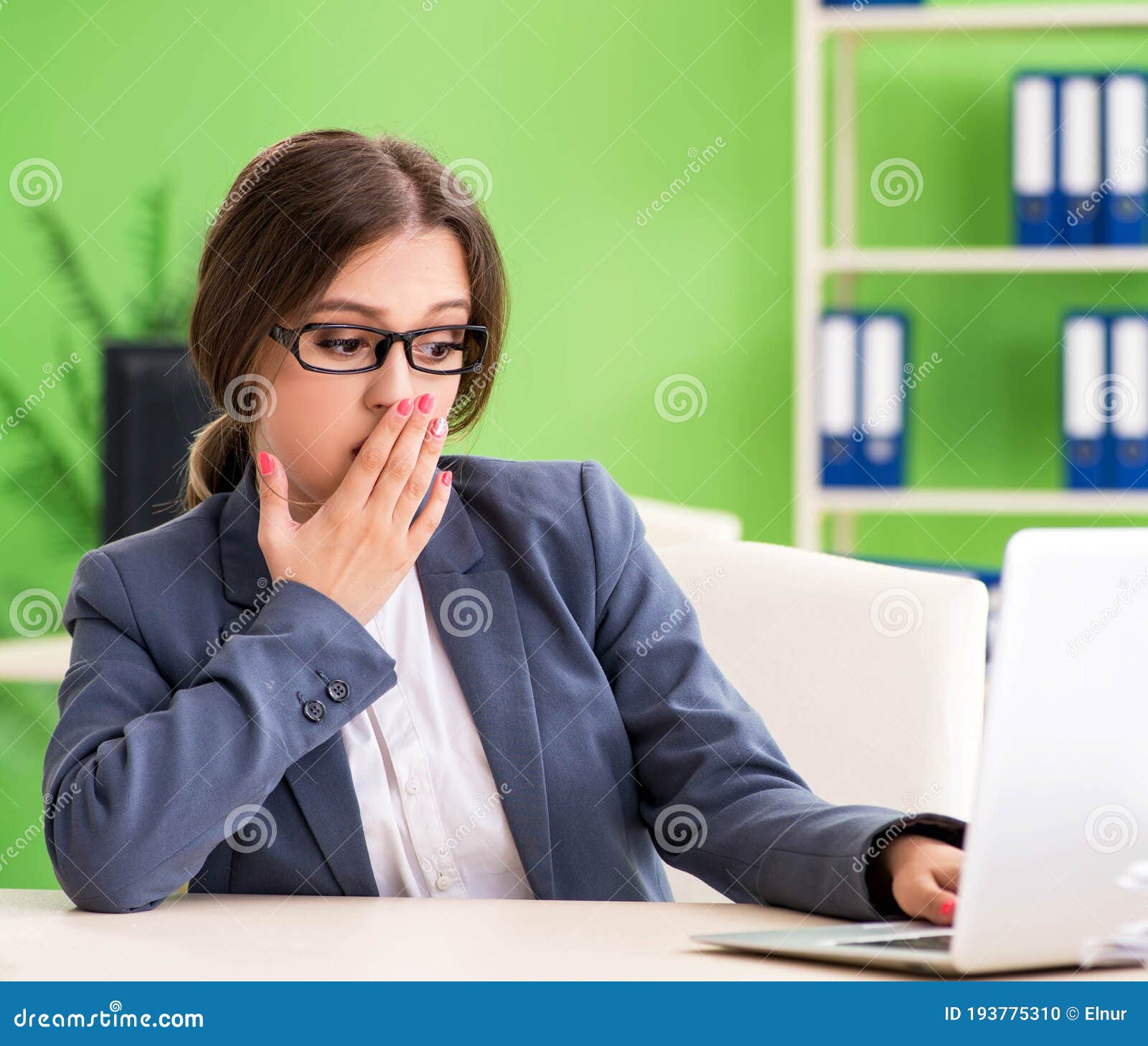 Young Female Employee Very Busy with Ongoing Paperwork Stock Photo ...