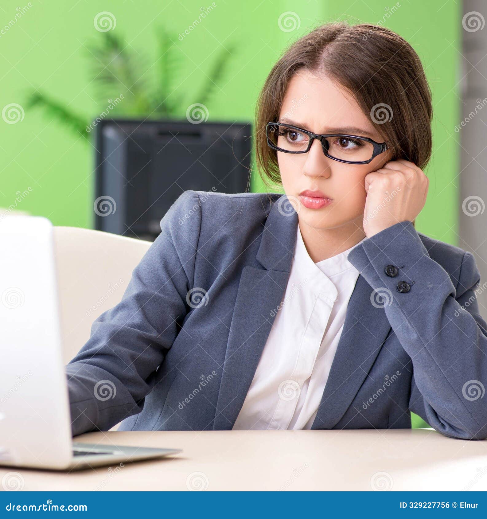 Young Female Employee Very Busy with Ongoing Paperwork Stock Photo ...