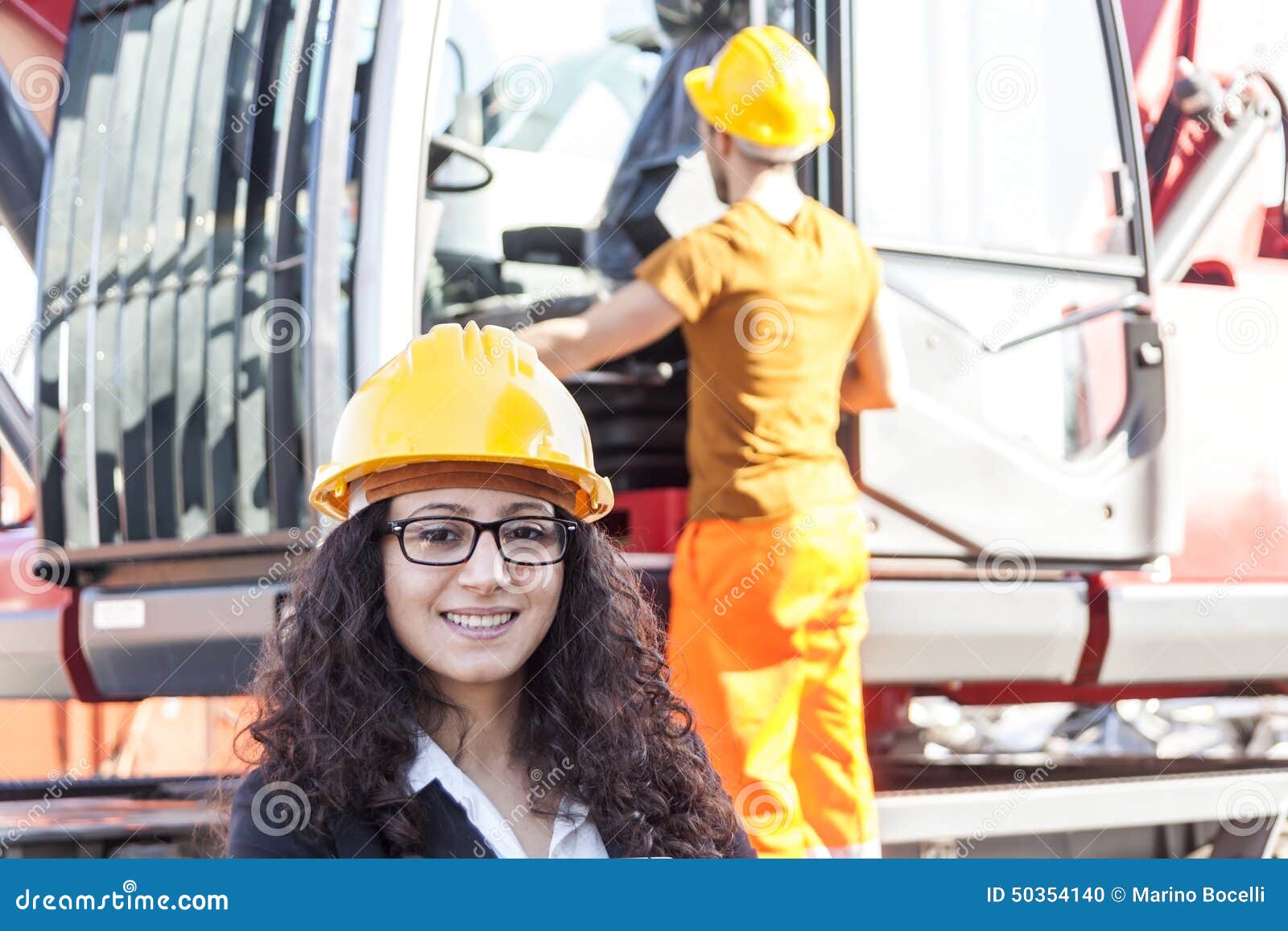 Young Female Engineer Posing in Junkyard Stock Photo - Image of ...