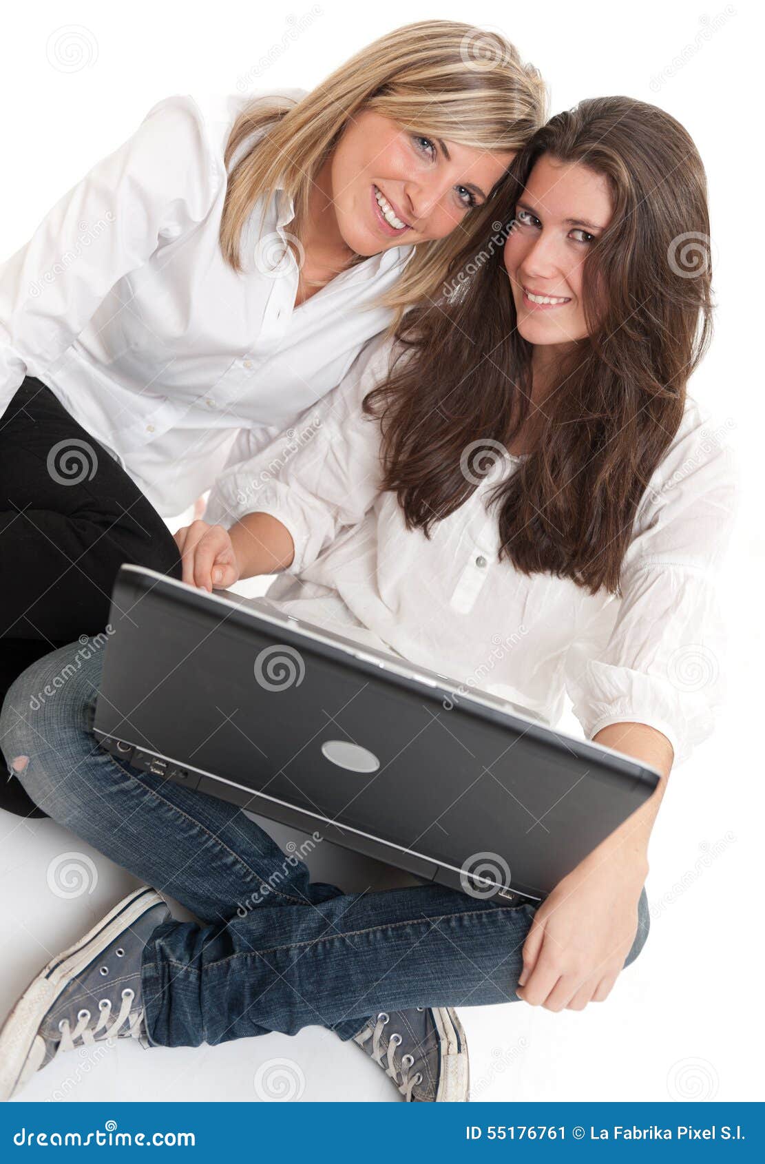 Young Female Friends with Laptop Stock Image - Image of jeans ...