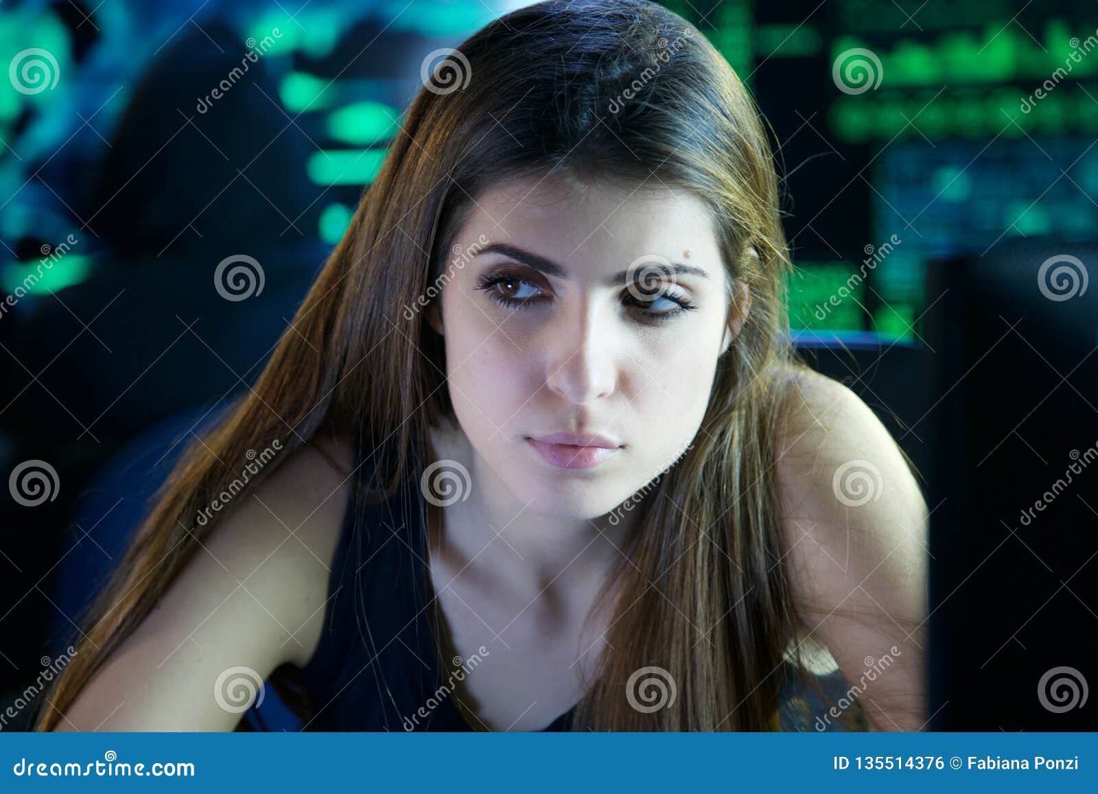 Young Female Hacker Studying Code with Partner in Crime Closeup Stock ...