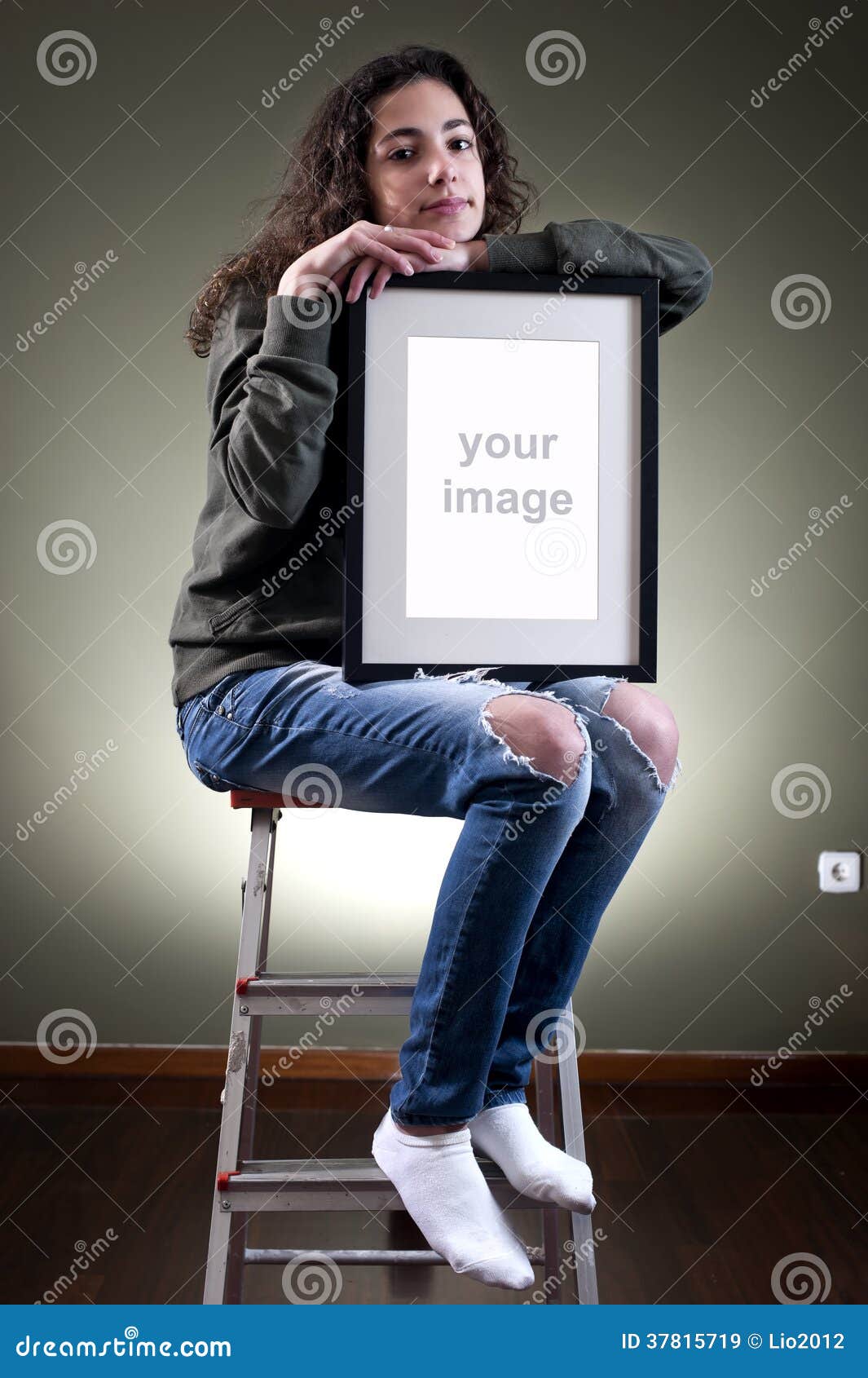 Young Female Holding Picture Frame Stock Image - Image of frames ...