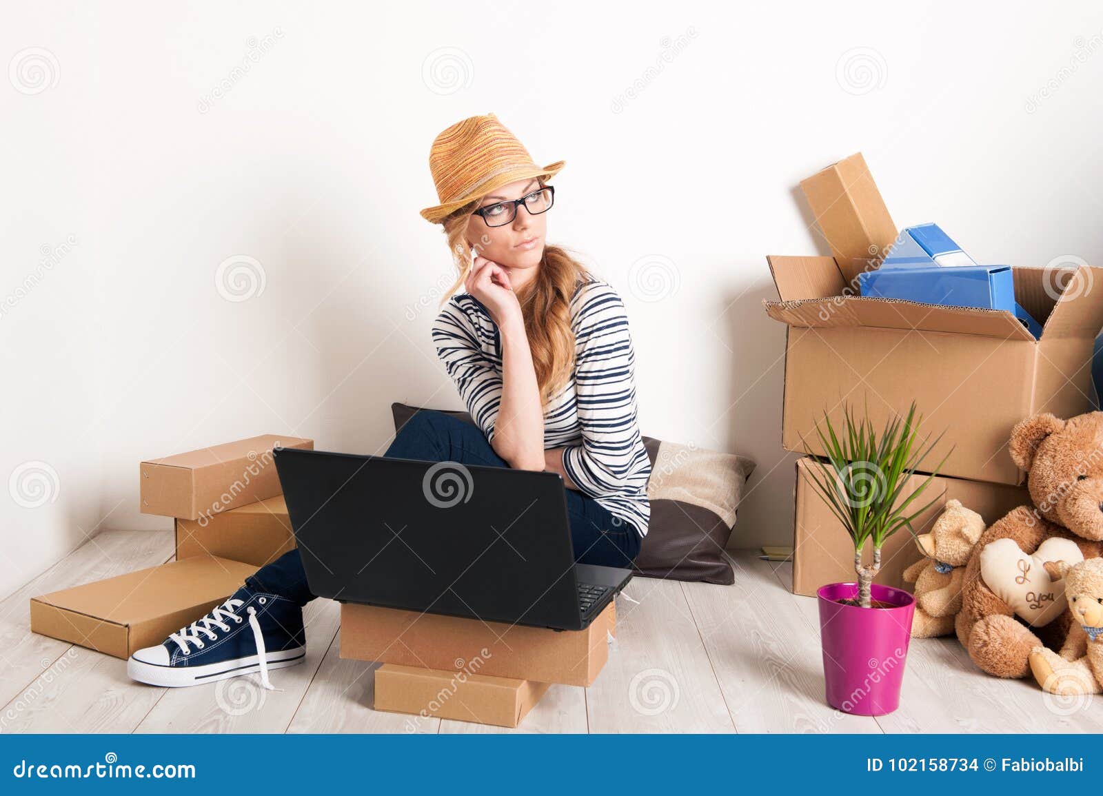 Young Female Just Moved in a New House. Stock Photo - Image of home ... Young Female Just Moved in a New House. Stock Photo - Image of home ...