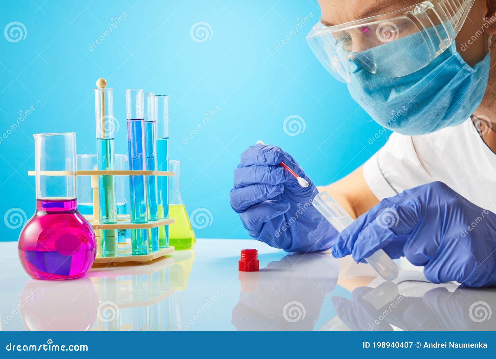 Young Female Lab Assistant or Scientist Hold Cotton Swab for the Test ...