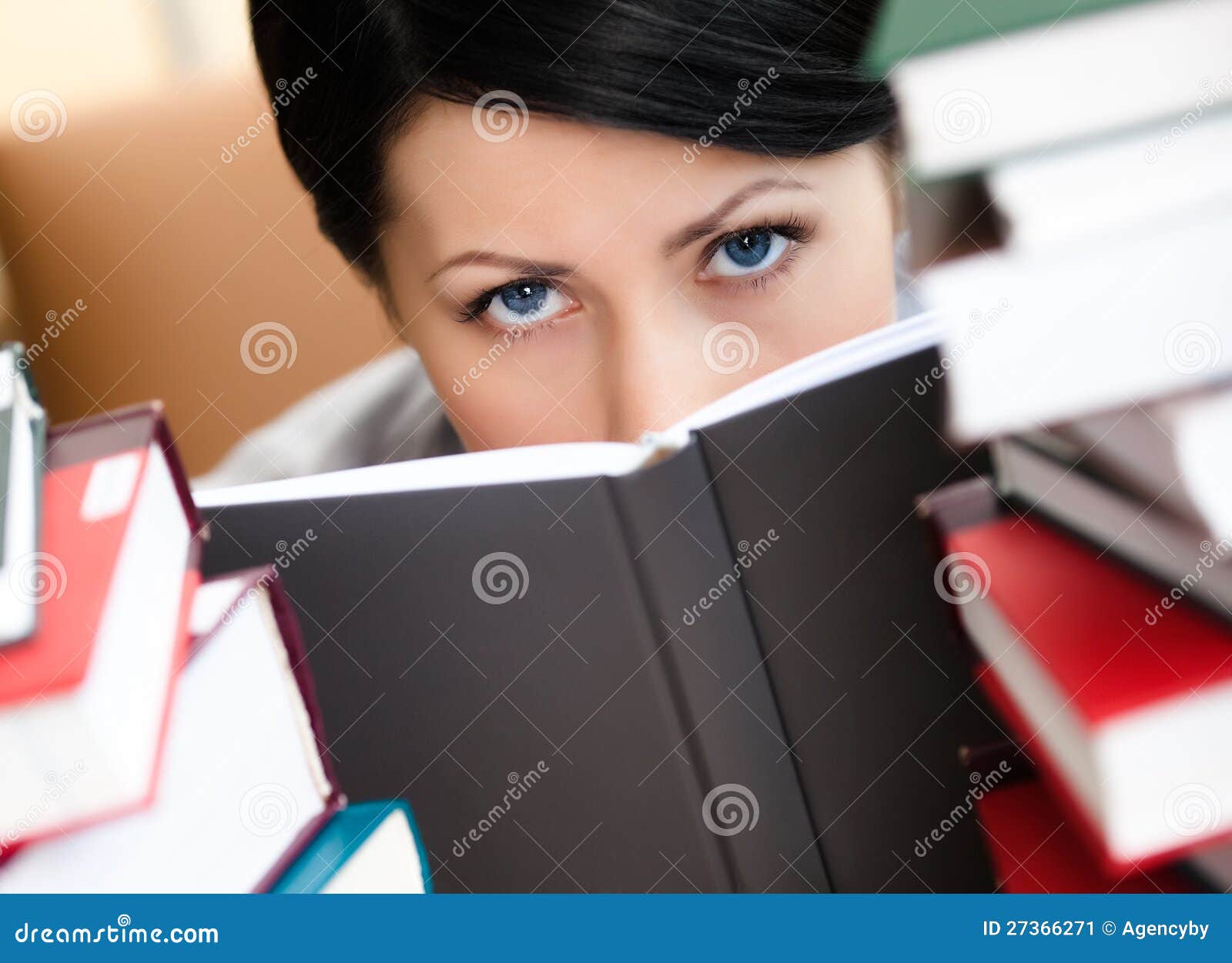 Young Female Looks Out Over the Book Stock Image - Image of learning ...