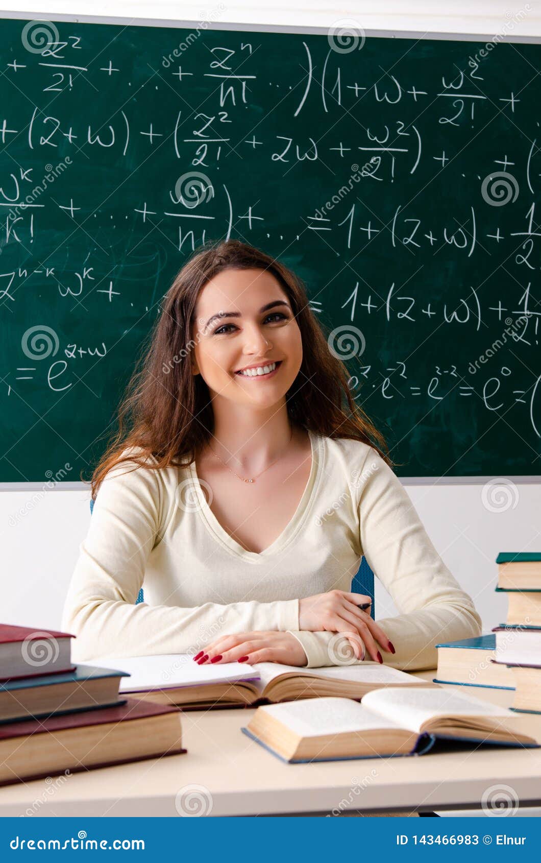 The Young Female Math Teacher in Front of Chalkboard Stock Image ...