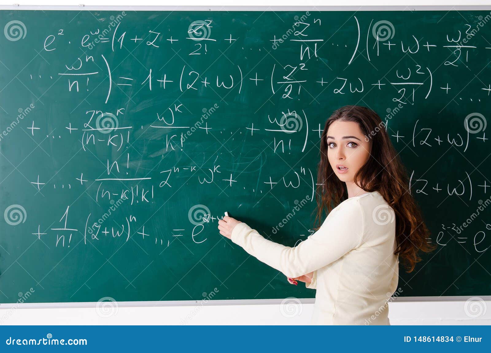 Young Female Math Teacher in Front of Chalkboard Stock Photo - Image of ...