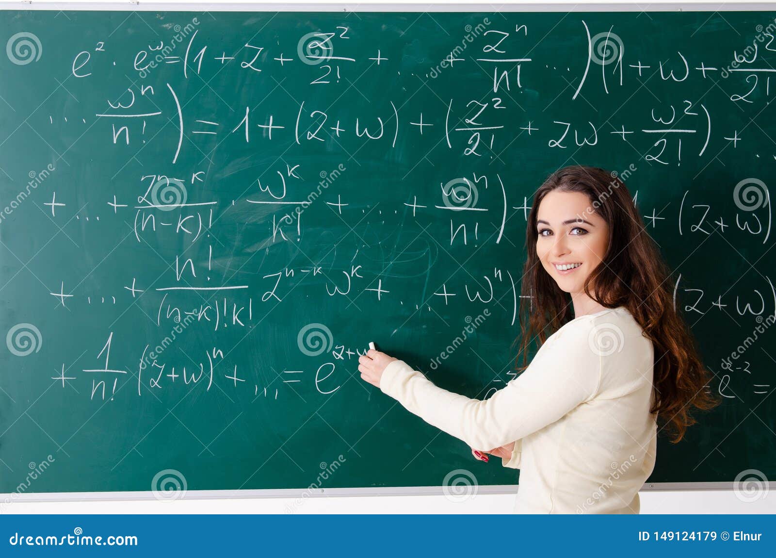 The Young Female Math Teacher in Front of Chalkboard Stock Image ...