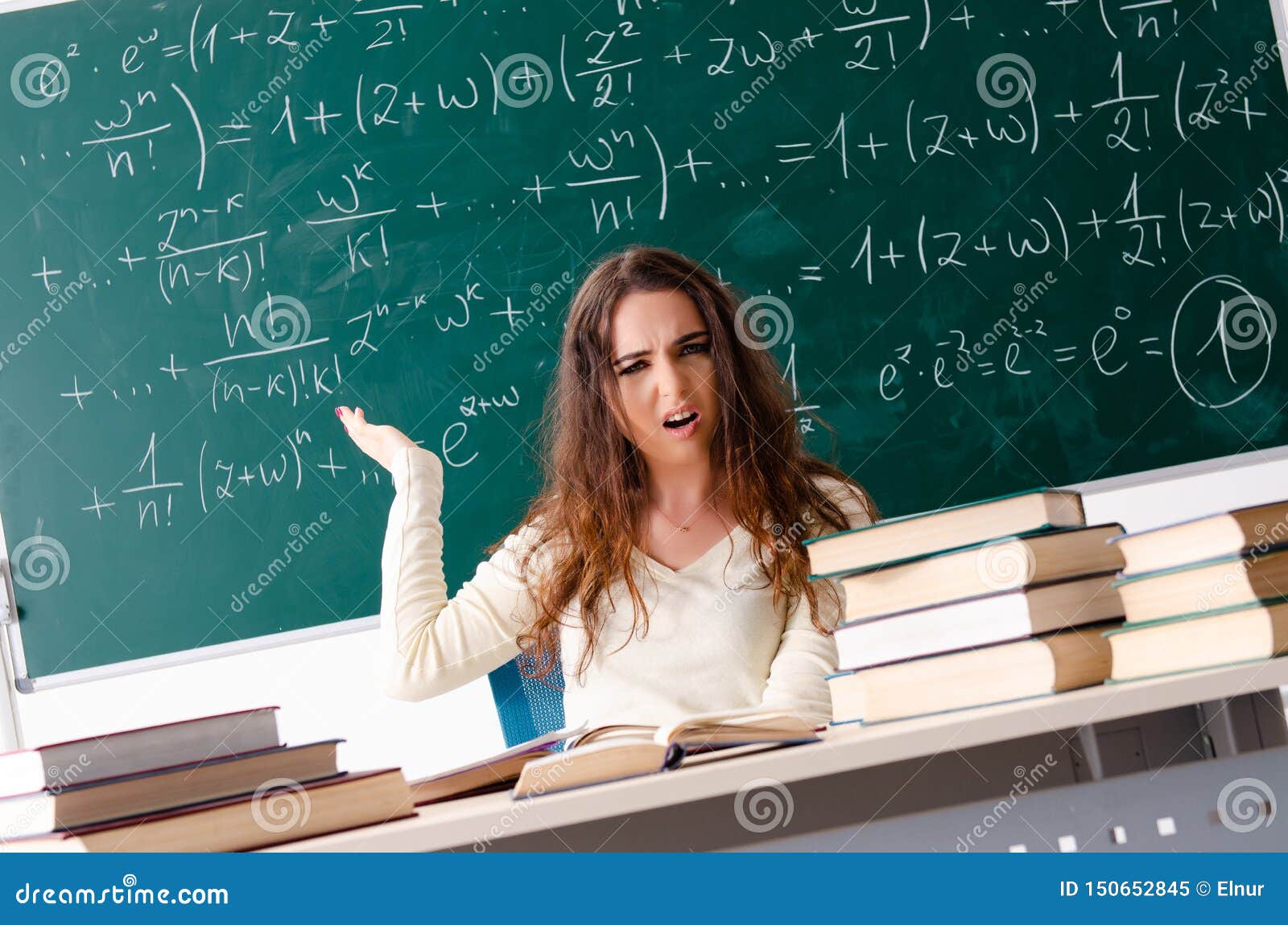 The Young Female Math Teacher in Front of Chalkboard Stock Image ...