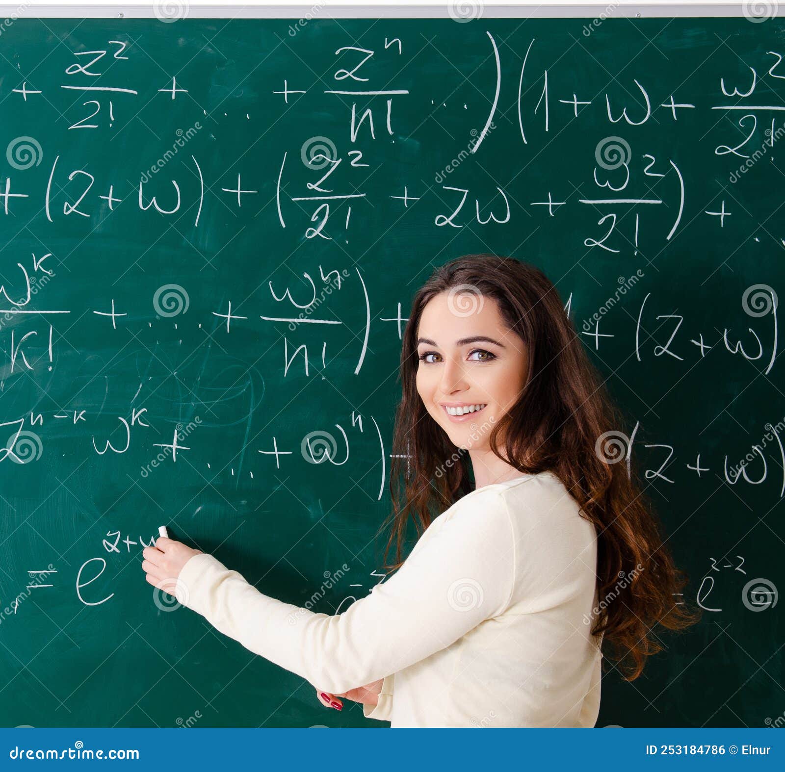 Young Female Math Teacher in Front of Chalkboard Stock Photo - Image of ...