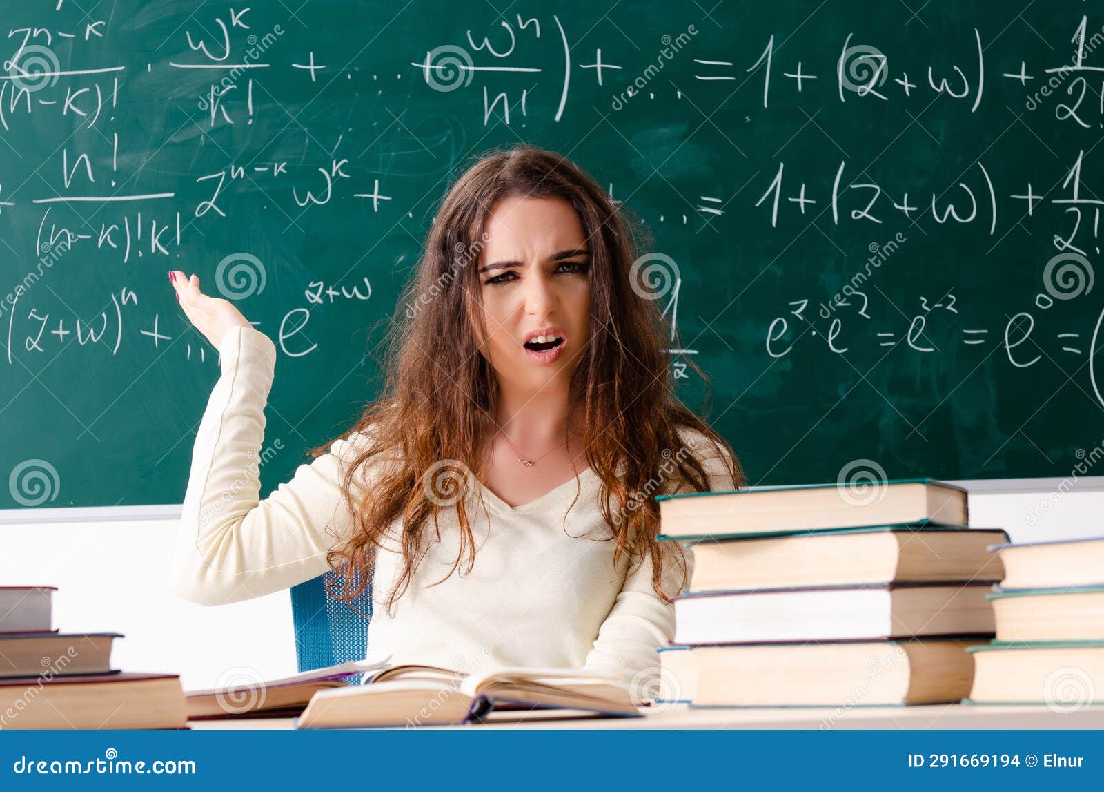 Young Female Math Teacher in Front of Chalkboard Stock Photo - Image of ...