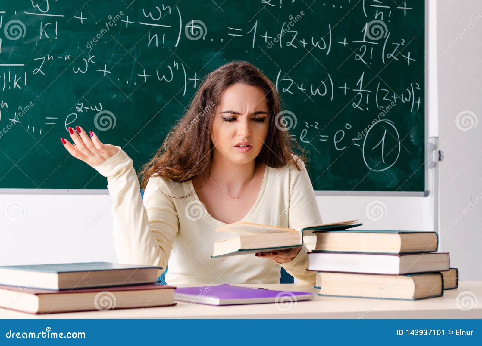 The Young Female Math Teacher in Front of Chalkboard Stock Image ...