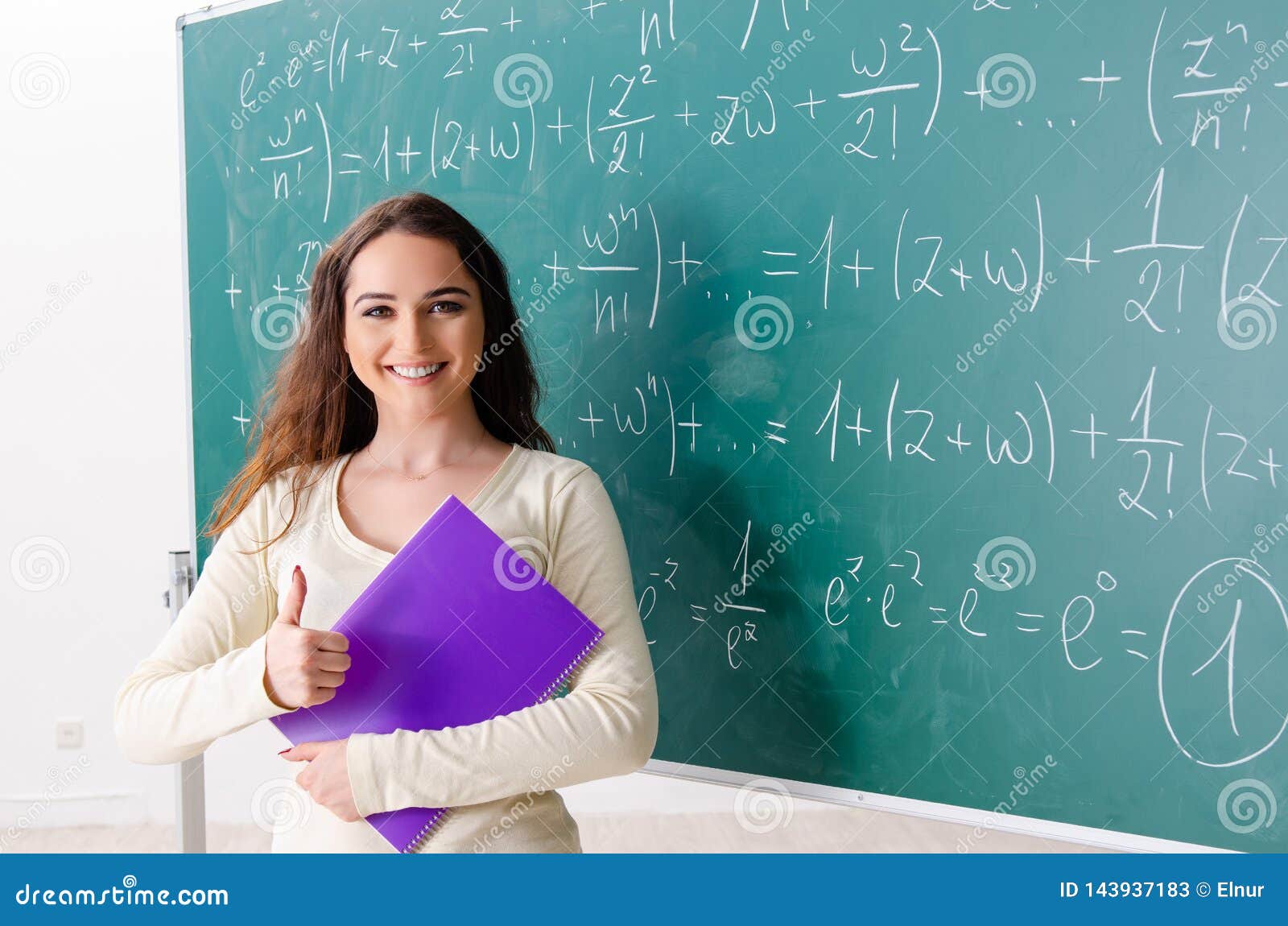 The Young Female Math Teacher in Front of Chalkboard Stock Image ...