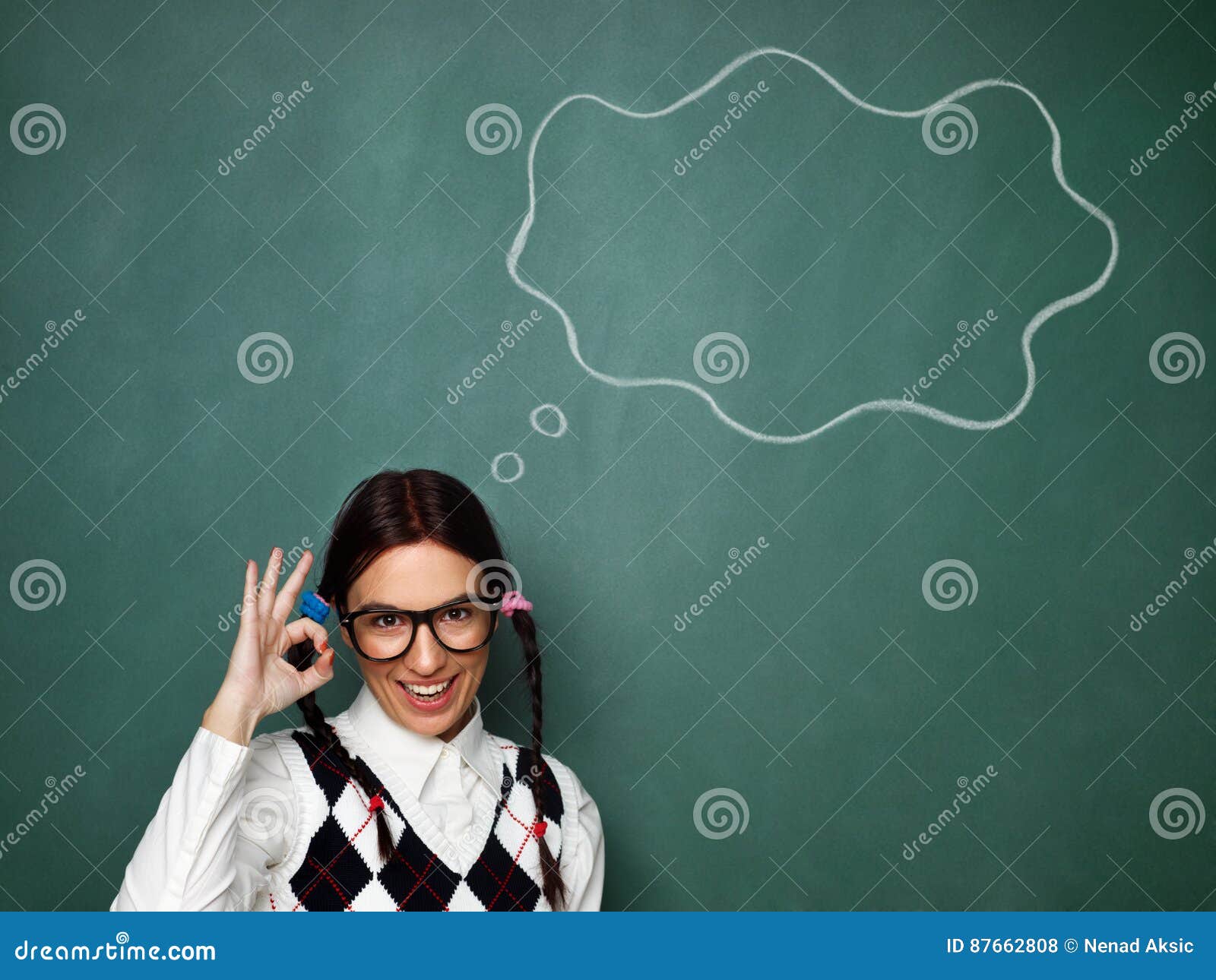 Young female nerd says OK stock photo. Image of looking - 87662808