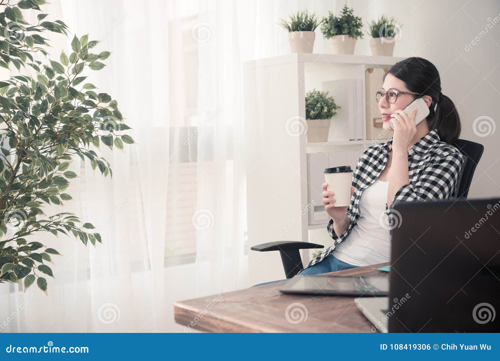 Young Female Office Worker Using Mobile Cell Phone Stock Photo - Image ...
