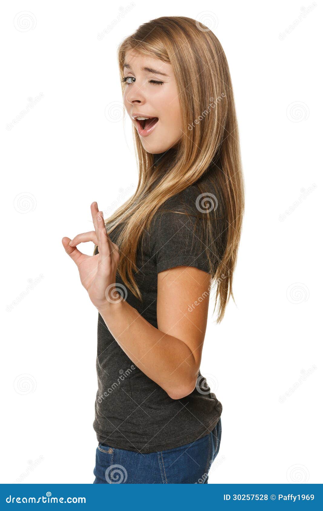 Young Winking Female Gesturing OK Stock Photo - Image of expressive ...