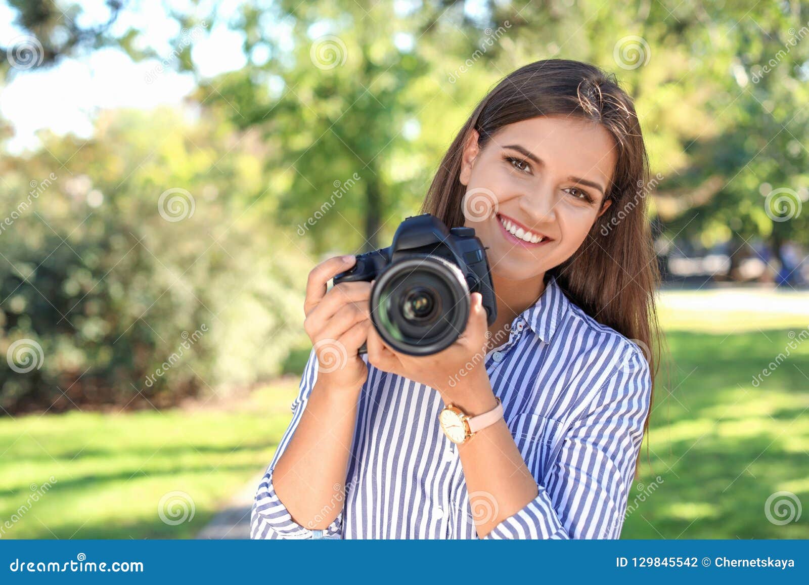Young Female Photographer with Professional Camera Stock Photo - Image ...