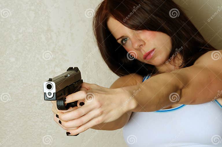 Young Female Pointing a Gun Stock Image - Image of protection, military ...