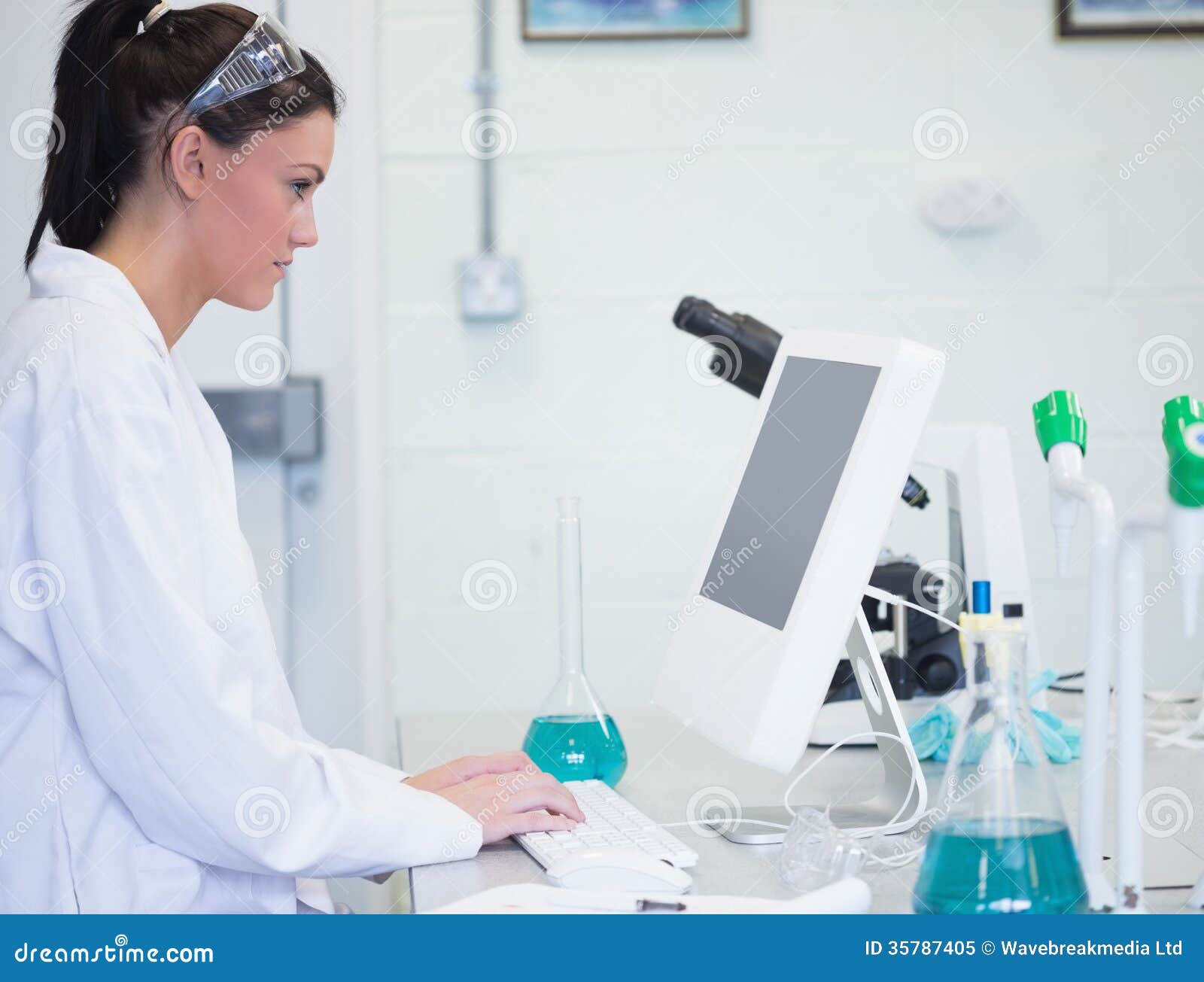 Young Female Researcher Using Computer in Lab Stock Image - Image of ...