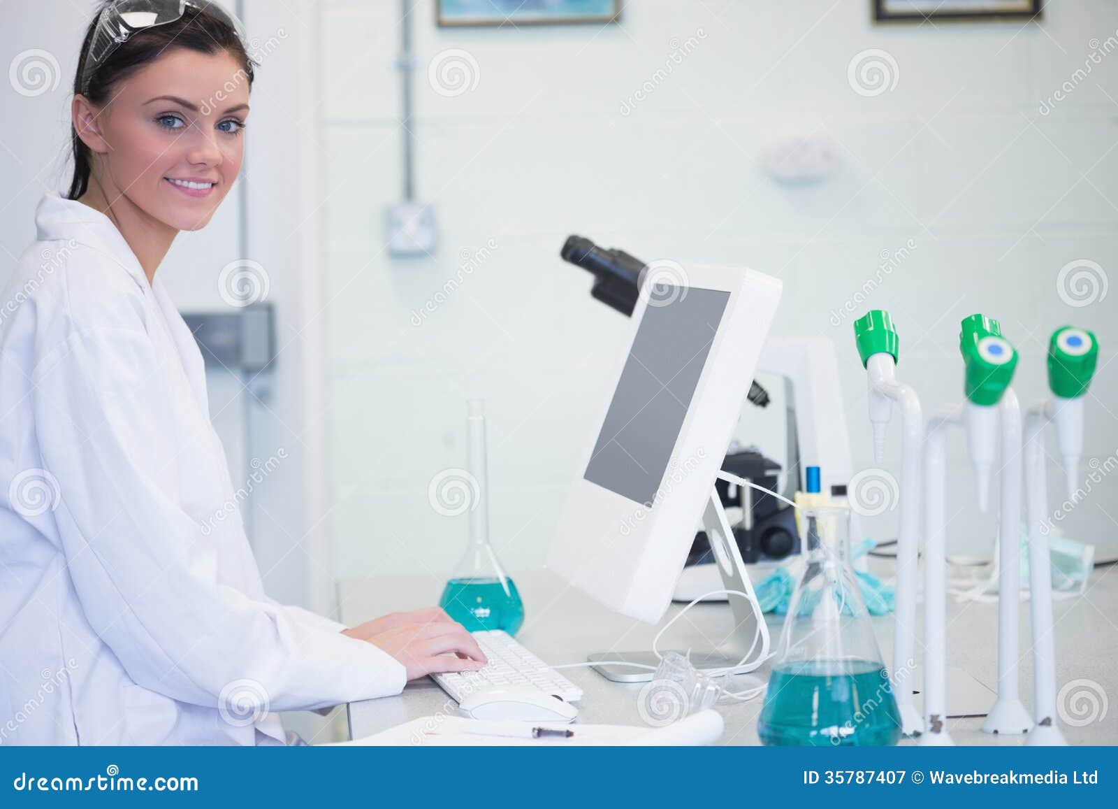 Young Female Researcher Using Computer in Lab Stock Image - Image of ...