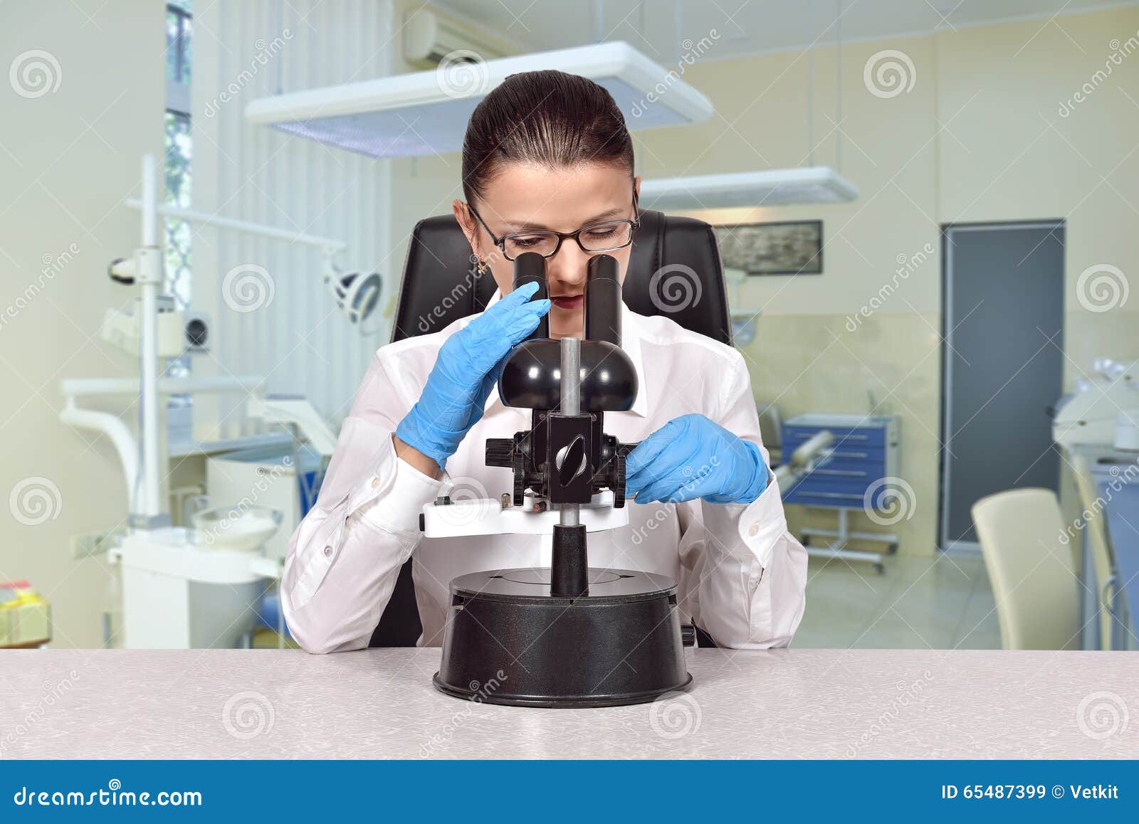 Young female scientist stock image. Image of examine - 65487399