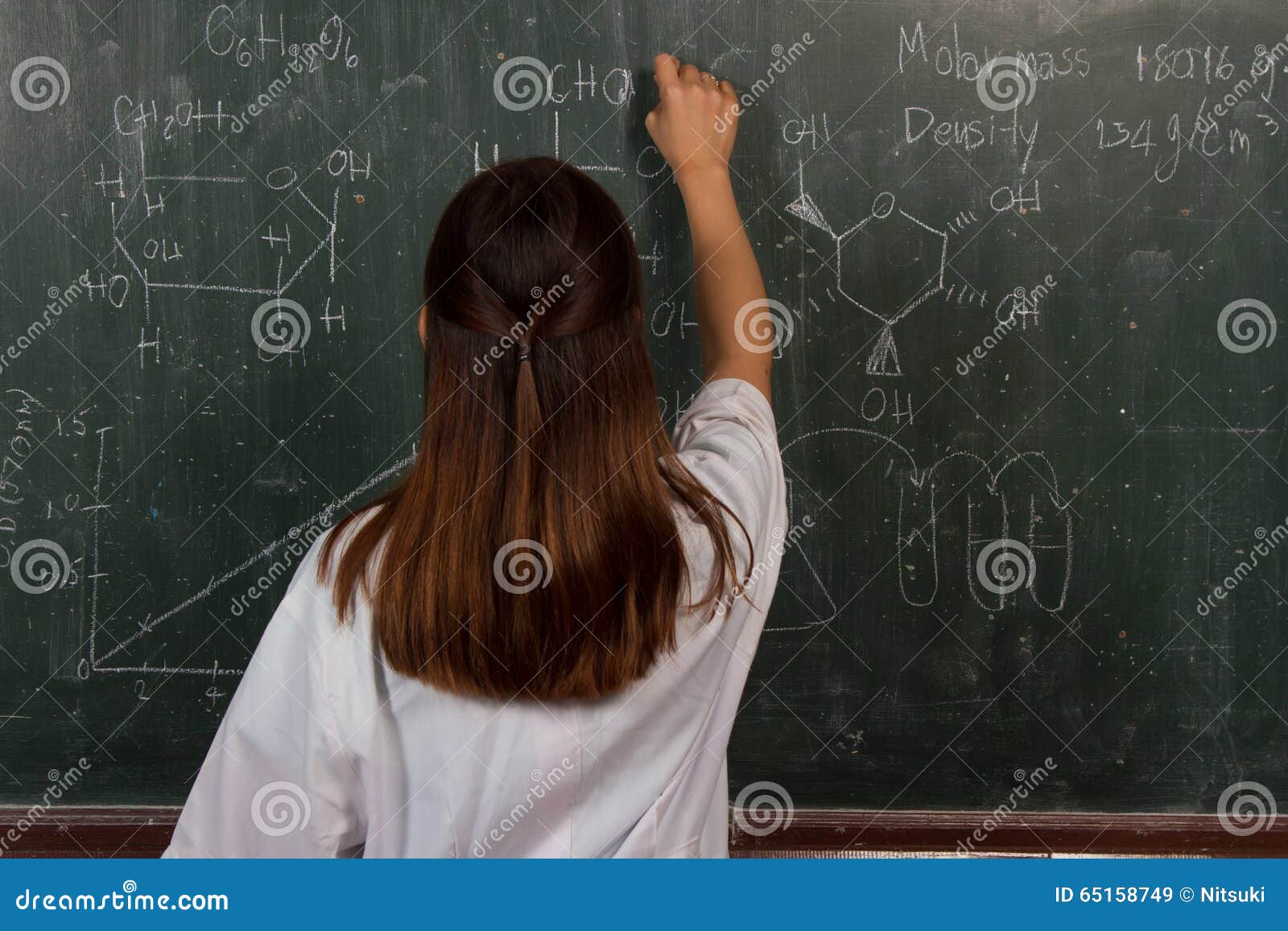Young Female Scientist Writing Molecular Structure Stock Image - Image ...