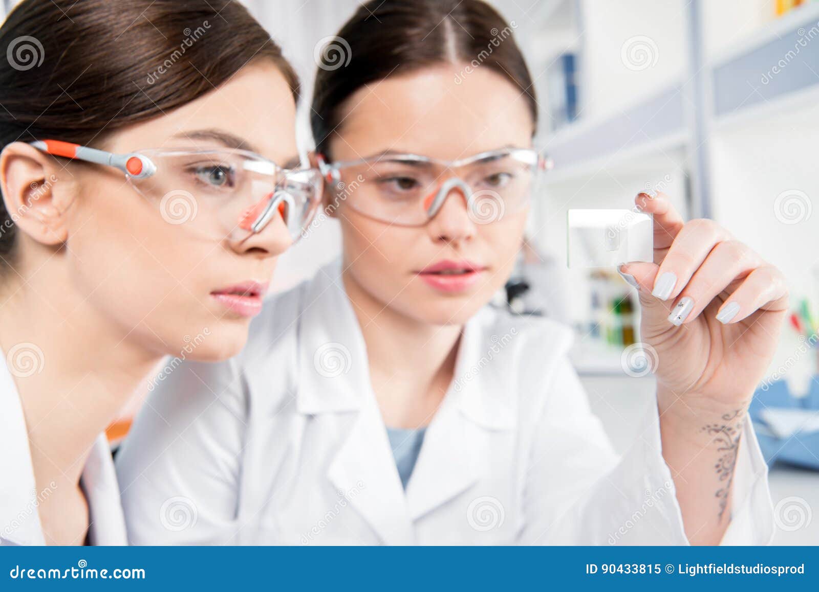 Young female scientists stock image. Image of laboratory - 90433815