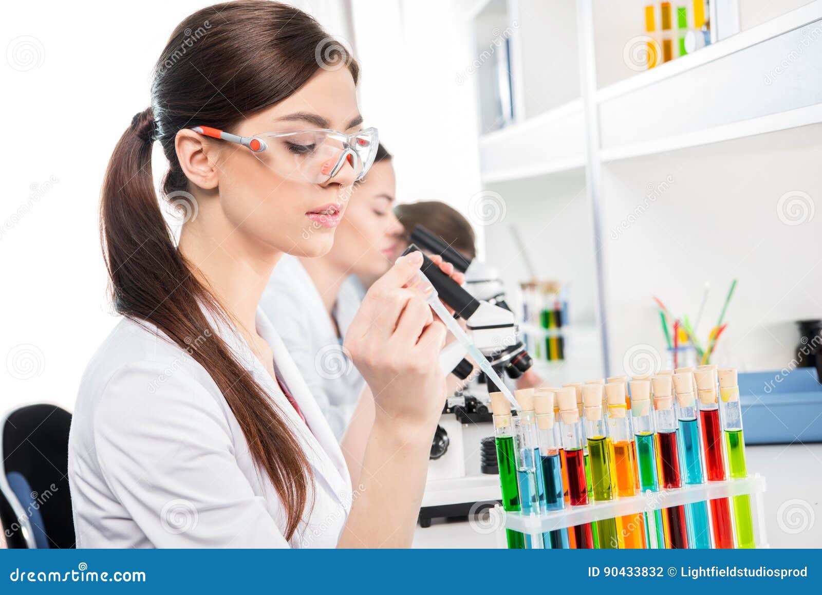 Young female scientists stock photo. Image of chemistry - 90433832