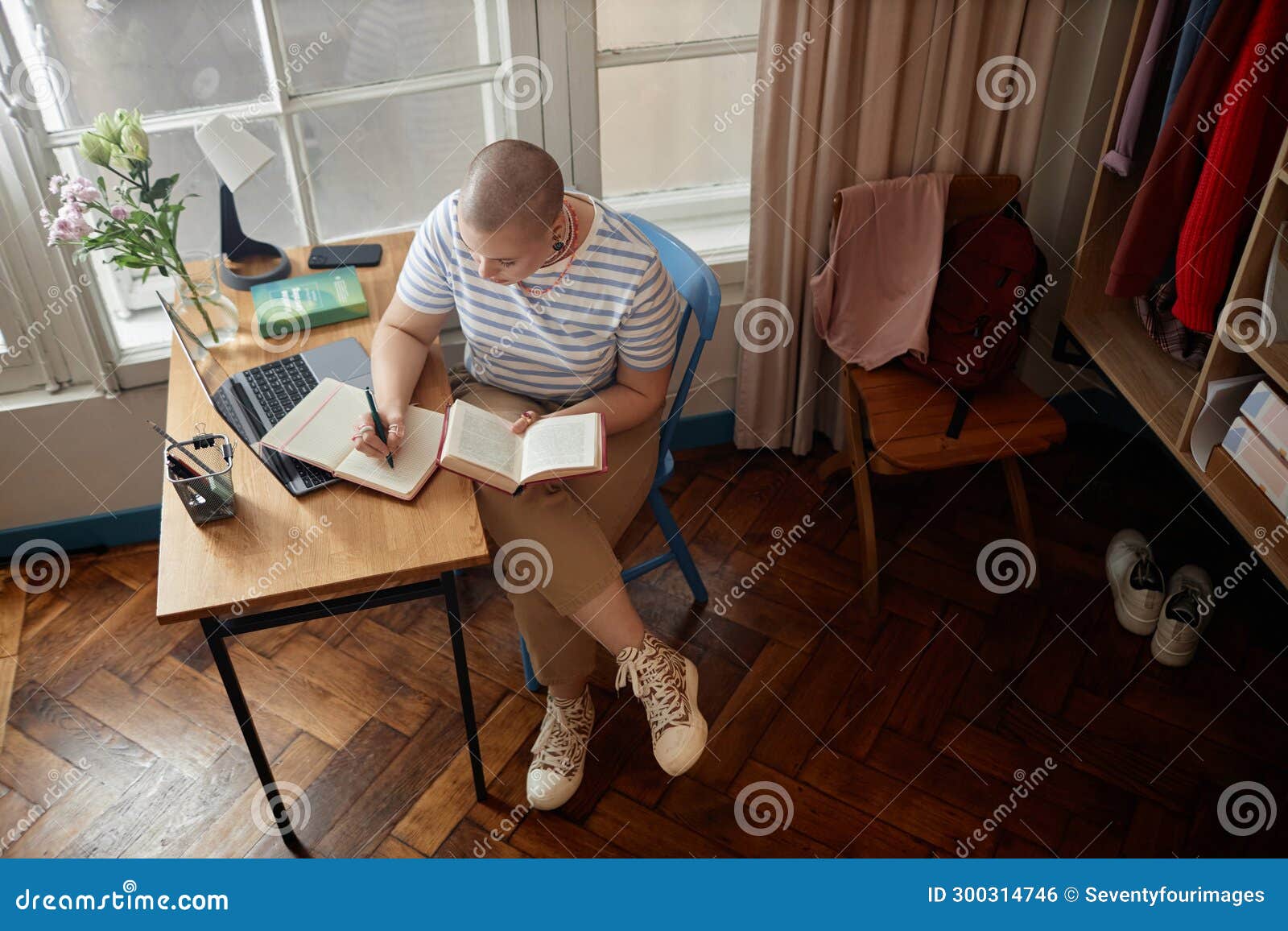 Young Female Student Doing Homework in Dorm Room Stock Photo - Image of ...