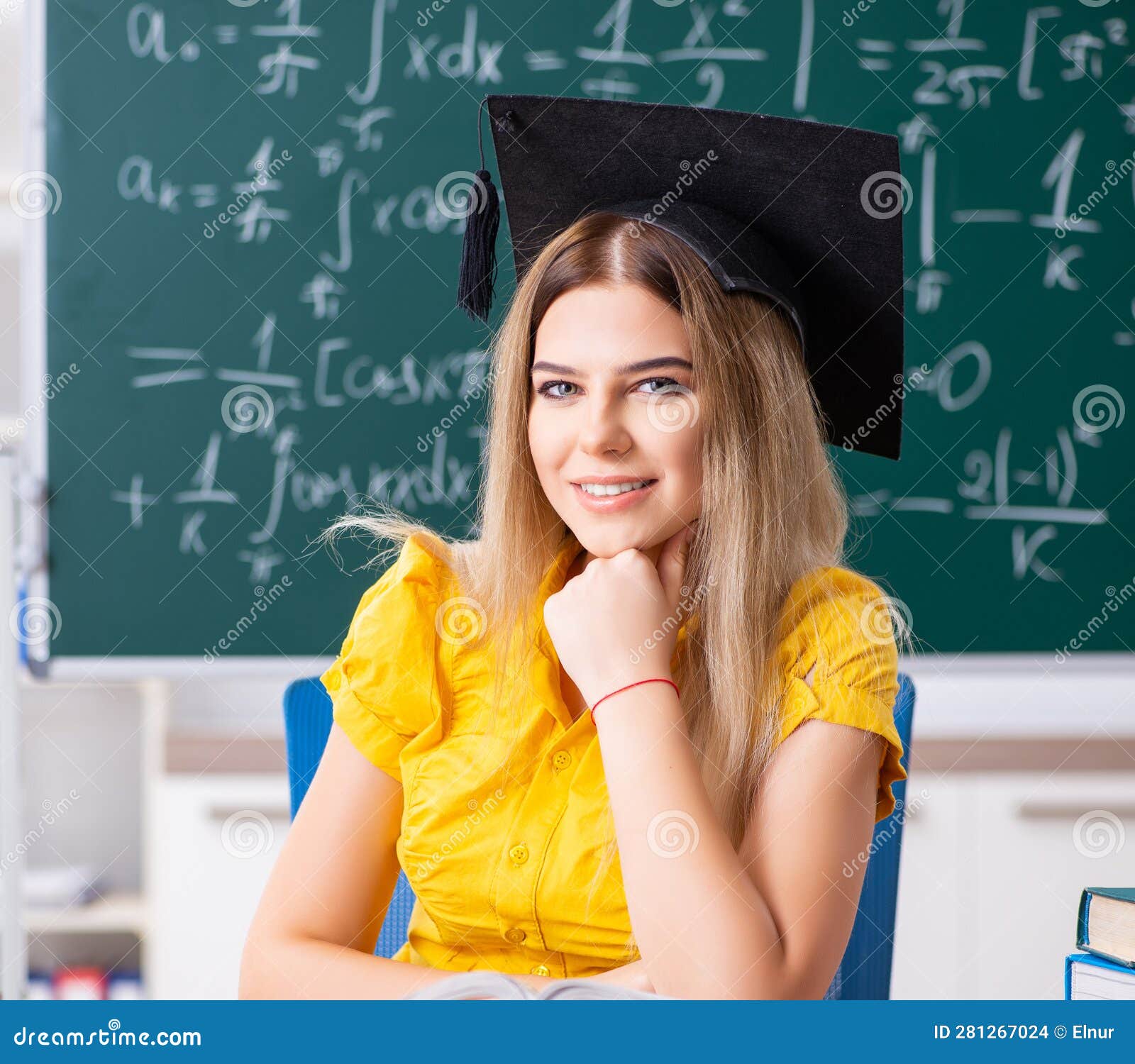 Young Female Student in Front of the Chalkboard Stock Photo - Image of ...