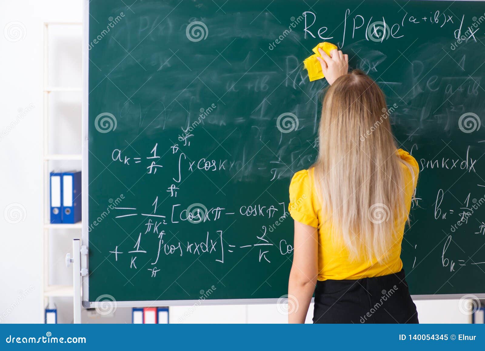 The Young Female Student in Front of the Chalkboard Stock Image - Image ...