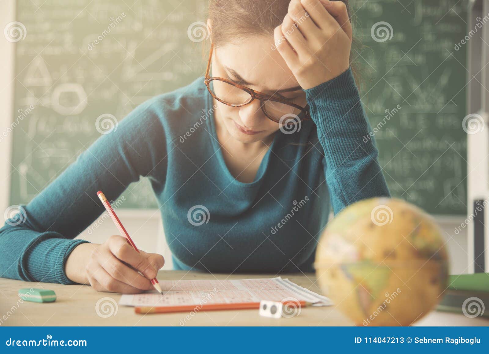 Young Female Student Having Examination Stock Image - Image of pencil ...