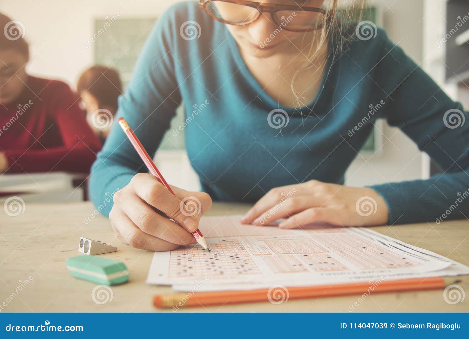 Young Female Student Having Examination in Classroom Stock Image ...