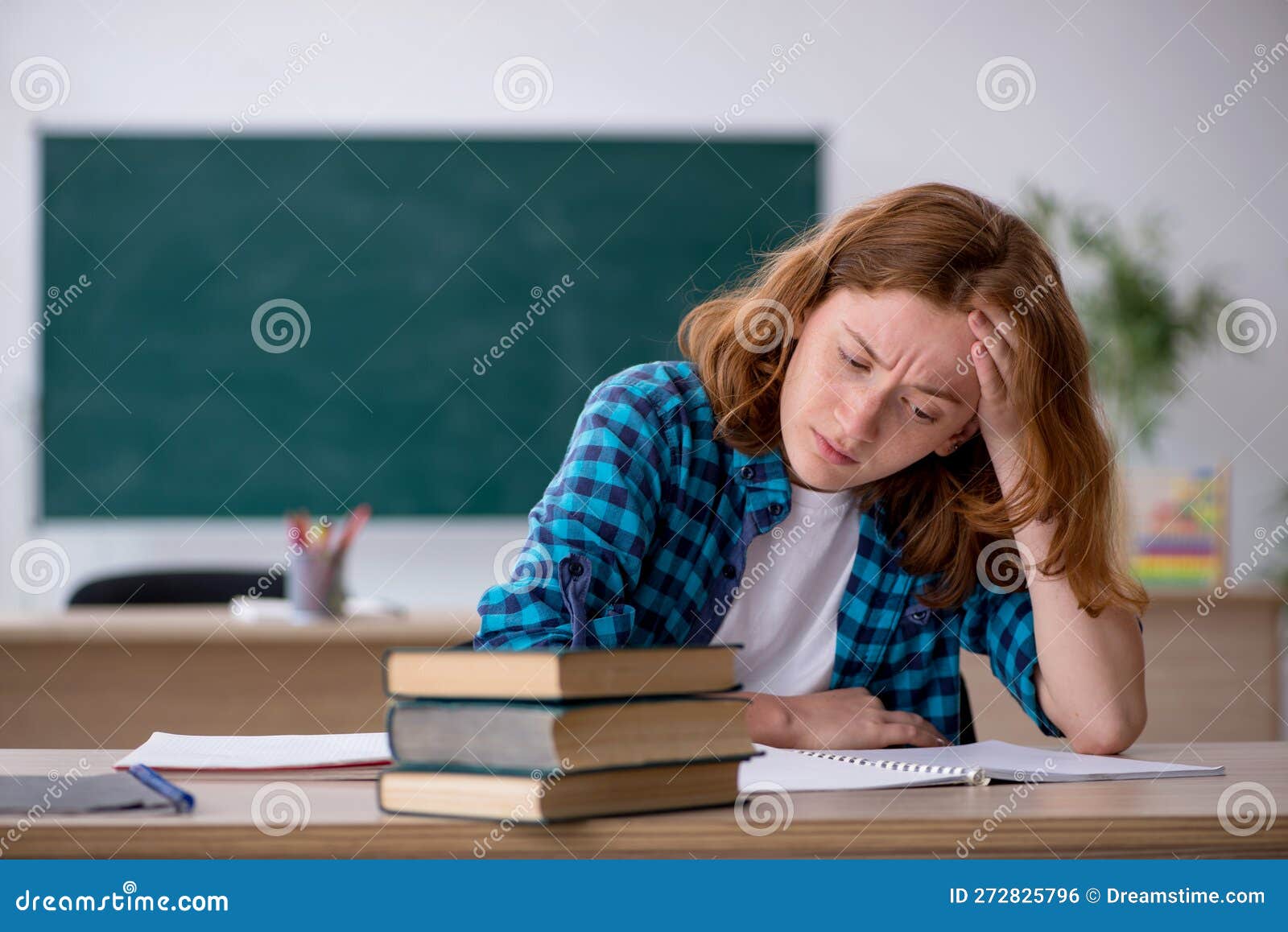 Young Female Student Preparing for Exam in the Classroom Stock Photo ...