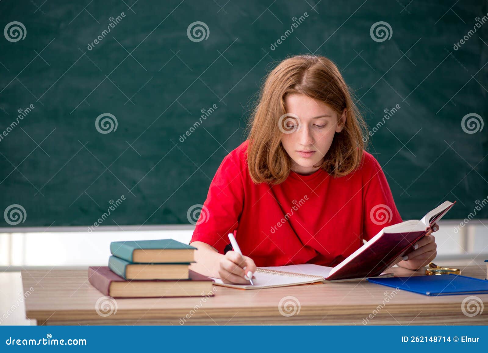 Young Female Student Preparing for Exams in the Classroom Stock Photo ...