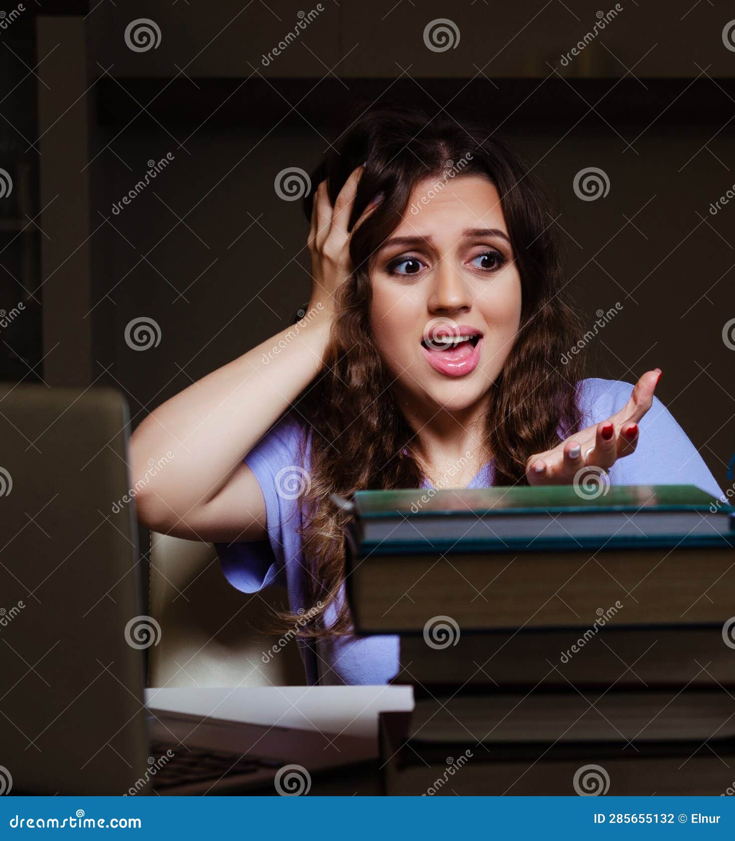 Young Female Student Preparing for Exams Late at Home Stock Photo ...